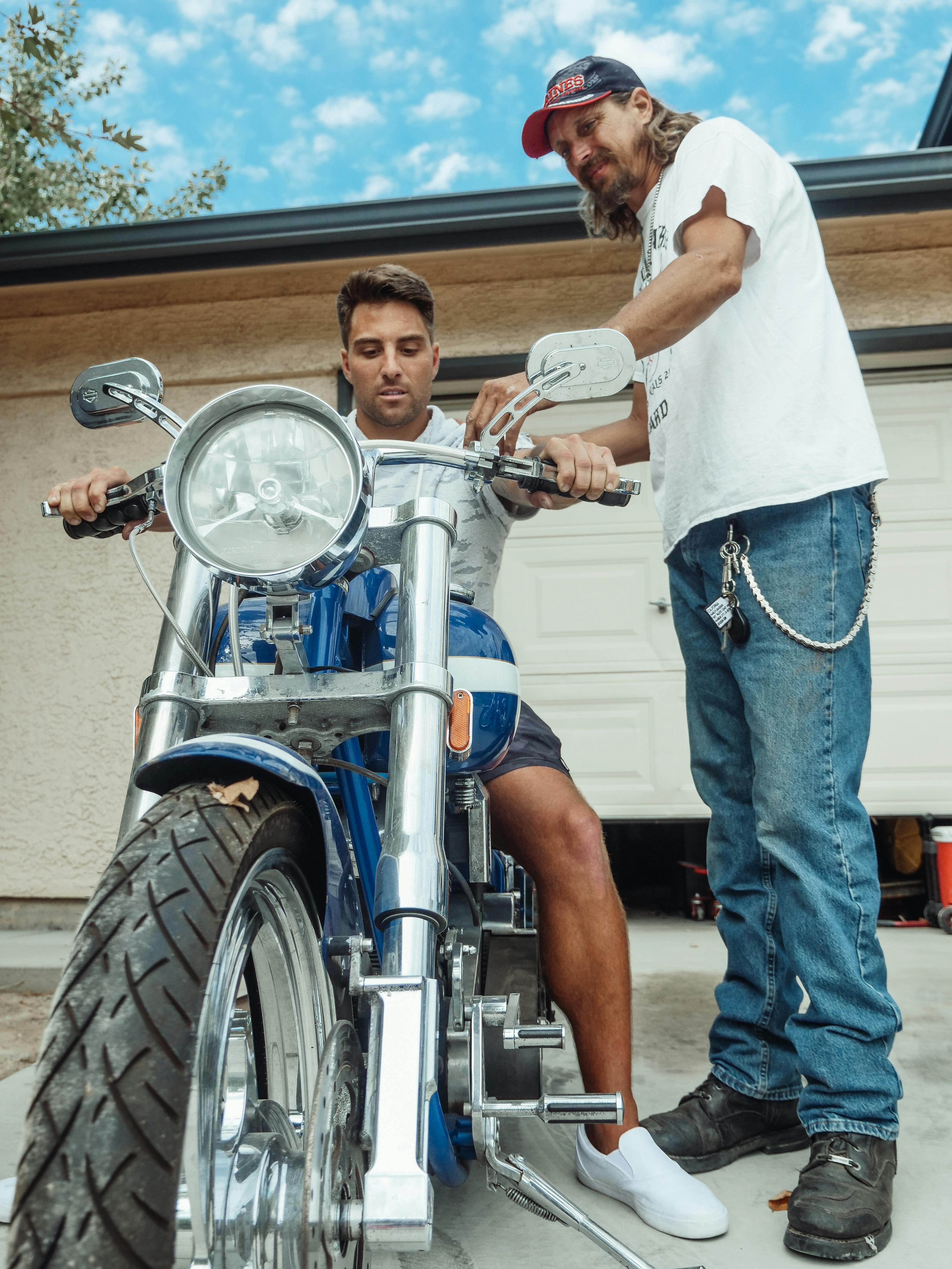 Man Test Riding a Motorcycle · Free Stock Photo