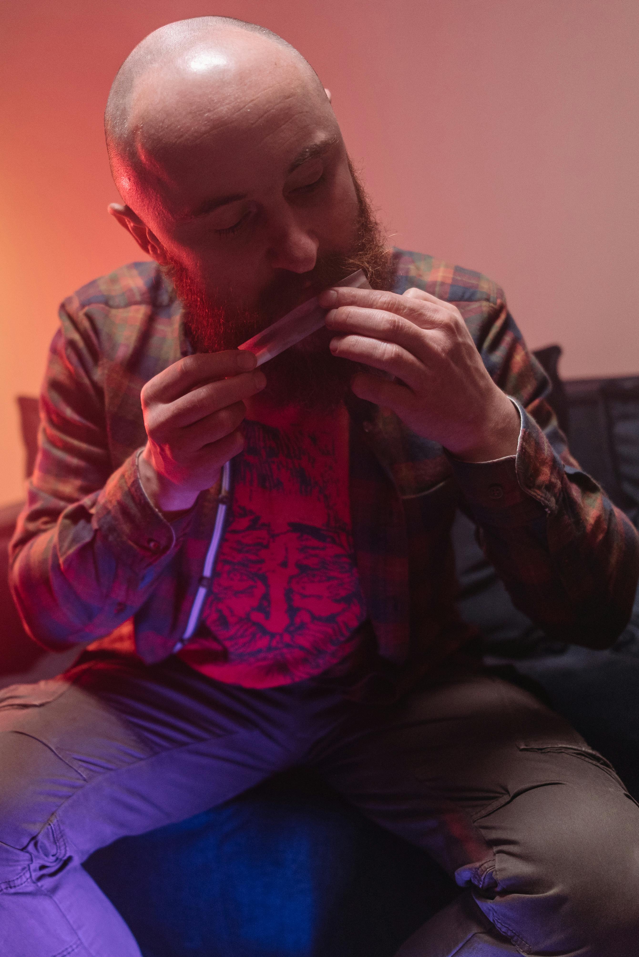 Man Making Joint on Party · Free Stock Photo