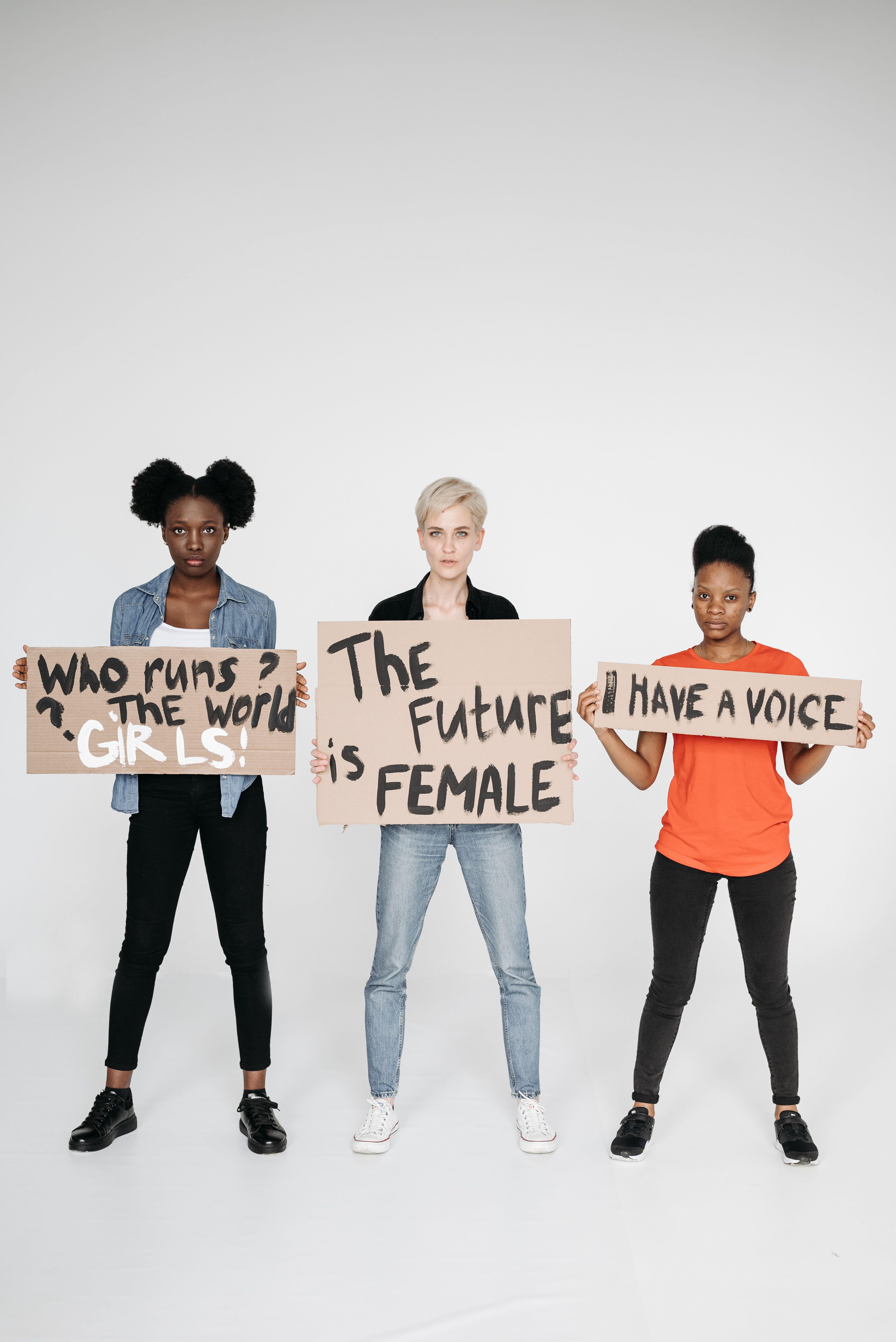 Women Standing Holding Placards · Free Stock Photo