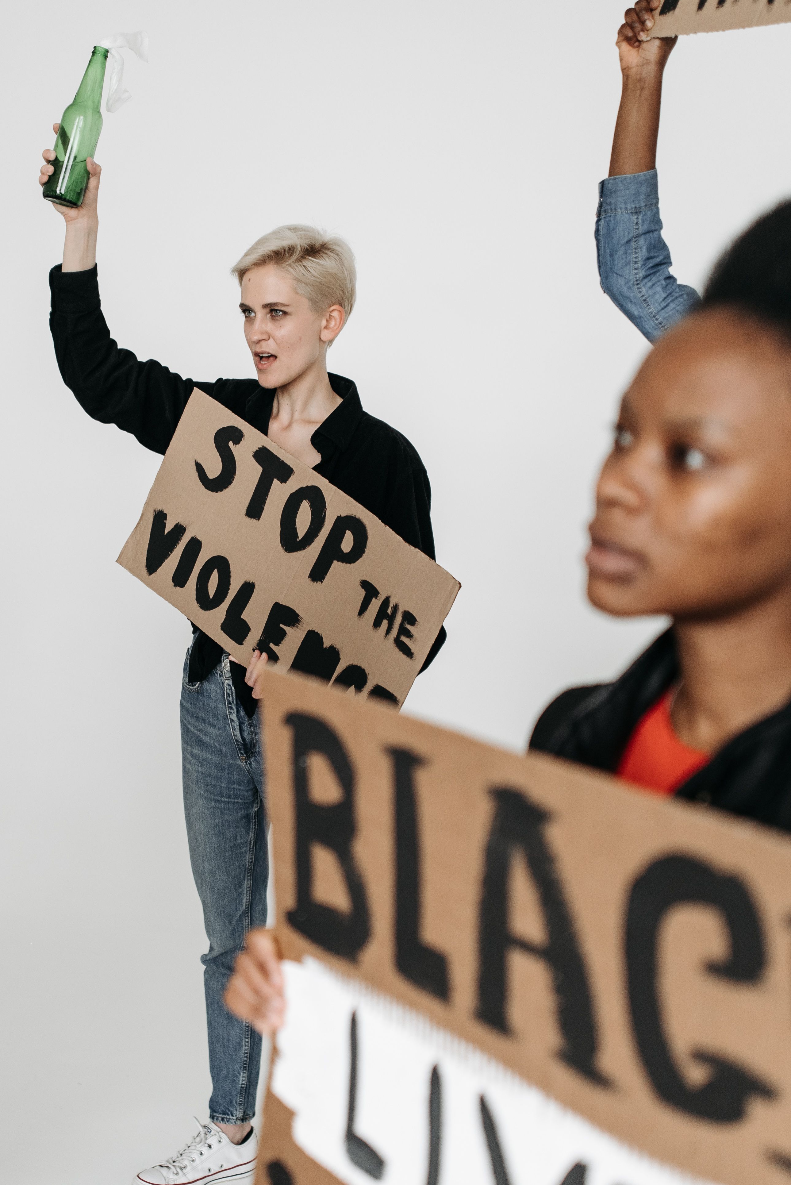 Women Holding Placards in Protest · Free Stock Photo