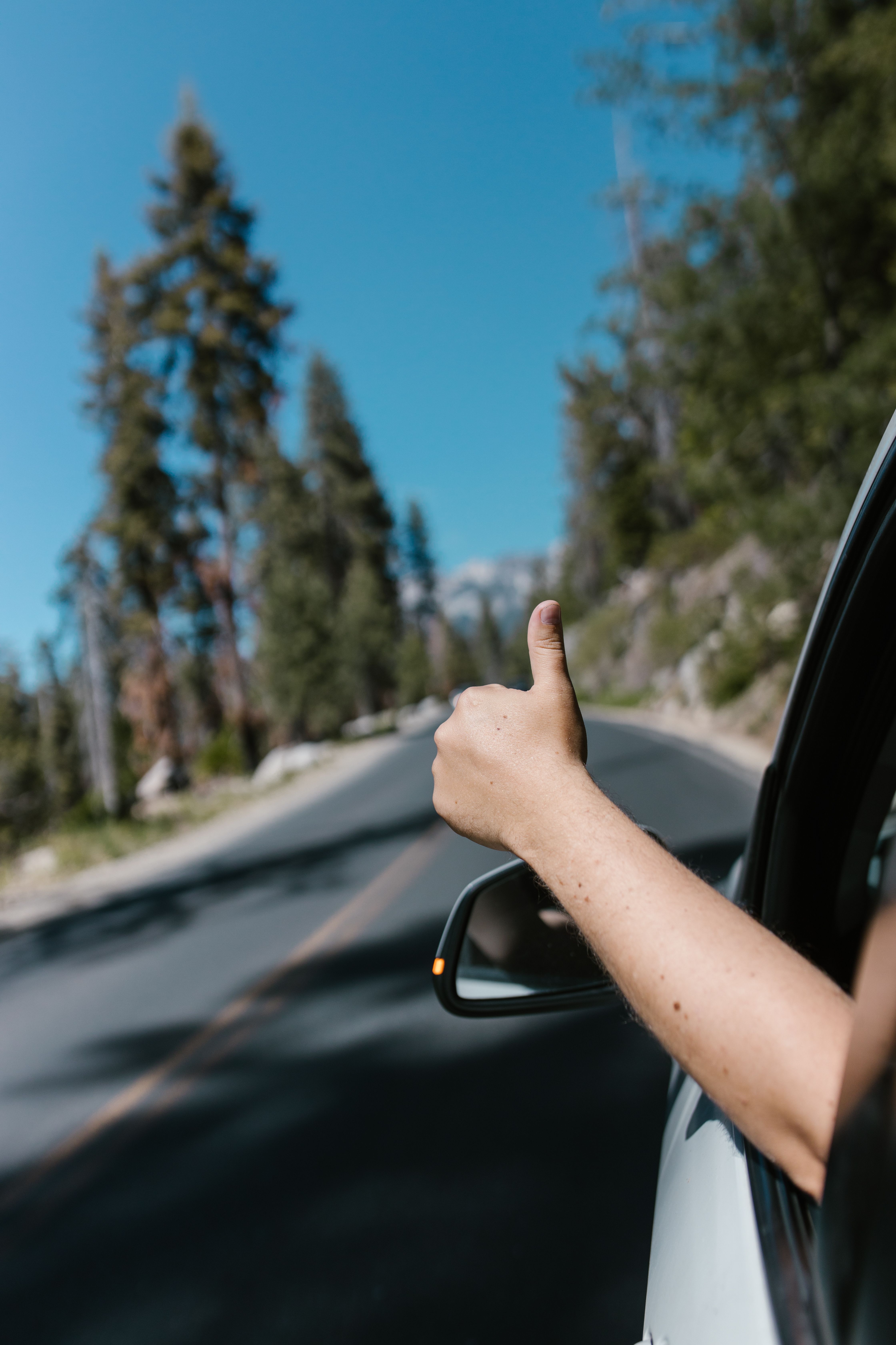 A Driver Giving a Thumbs Up · Free Stock Photo