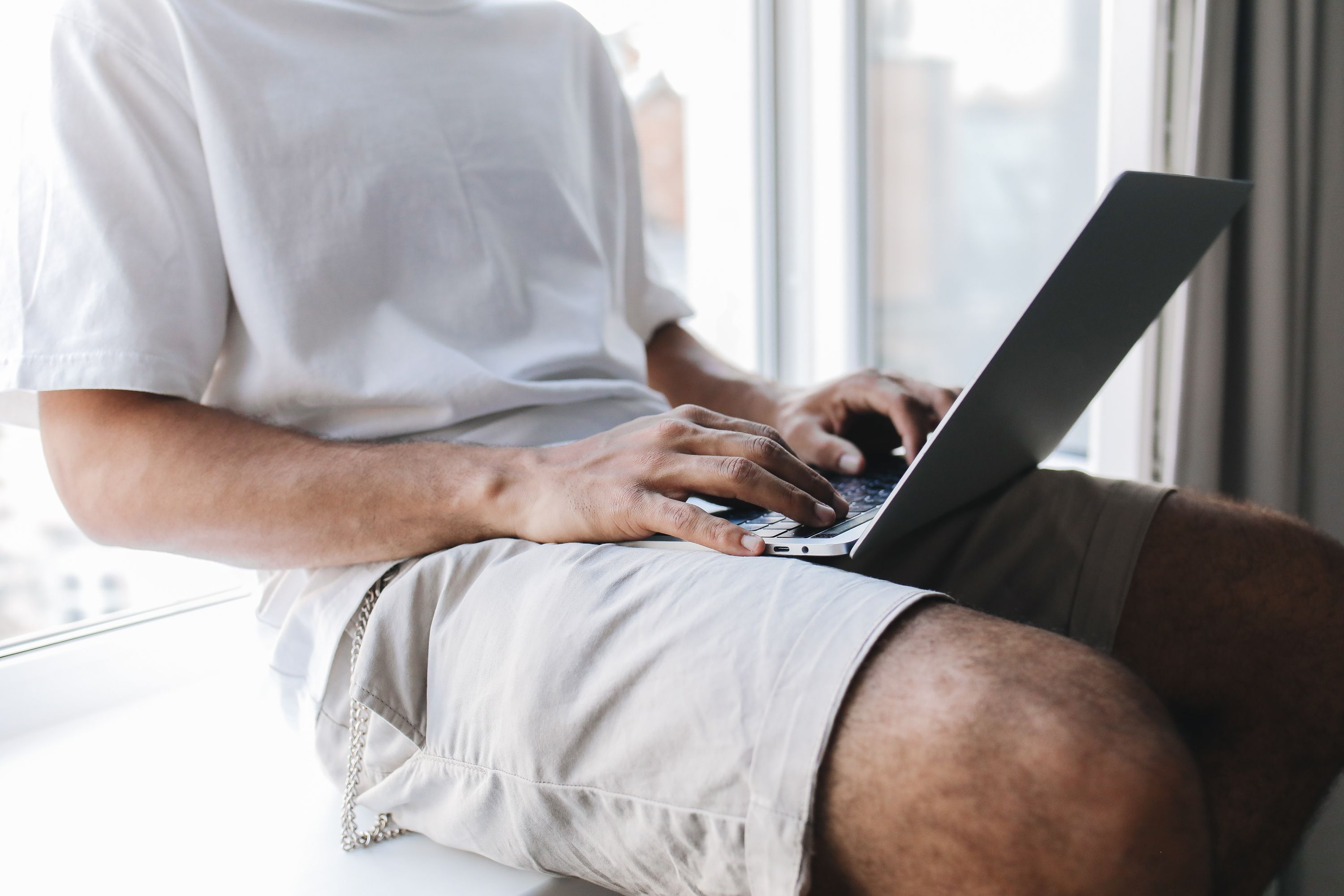 A Person Typing on Laptop · Free Stock Photo