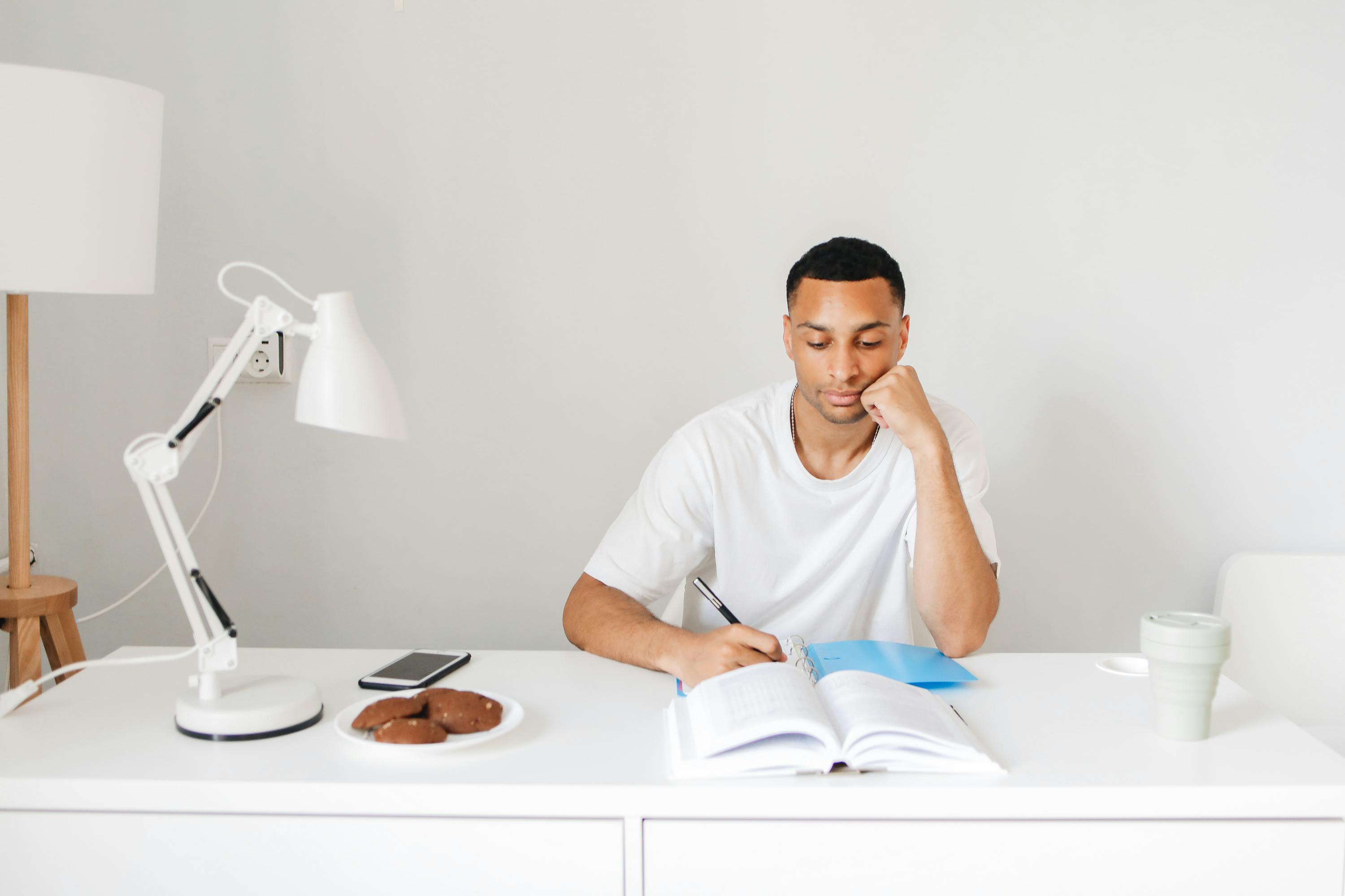 A Man Studying at Home · Free Stock Photo