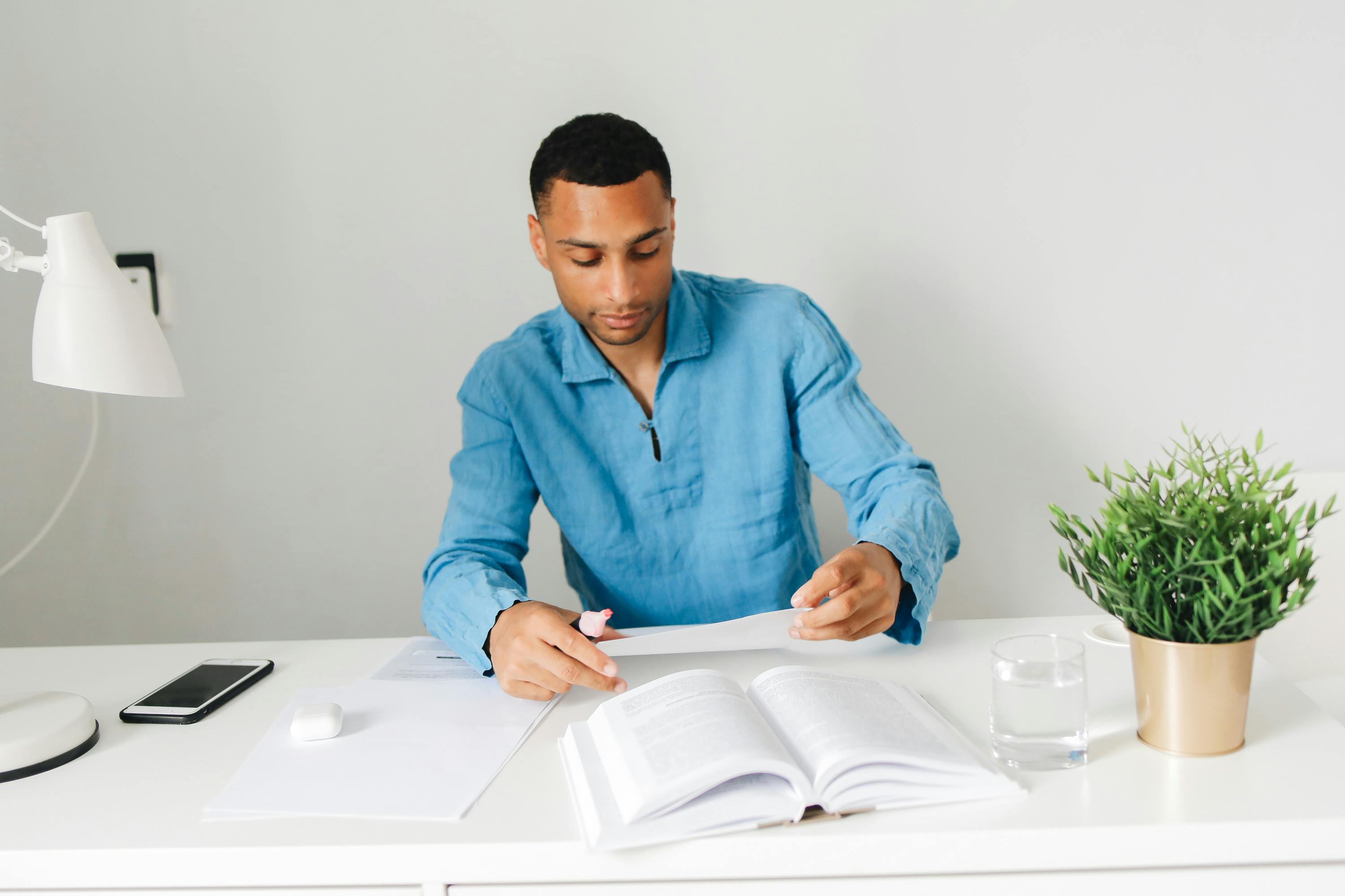 A Man Studying at Home · Free Stock Photo