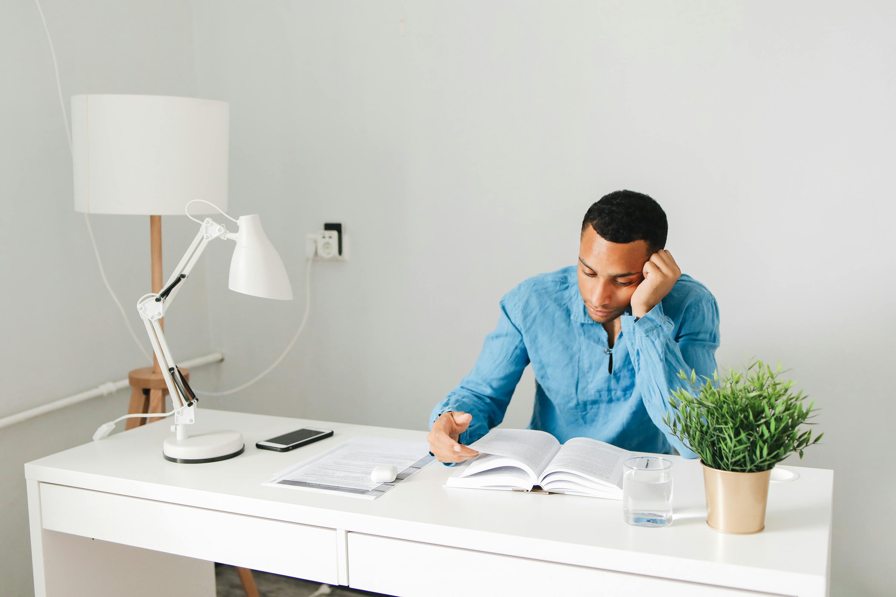 A Man Studying at Home · Free Stock Photo