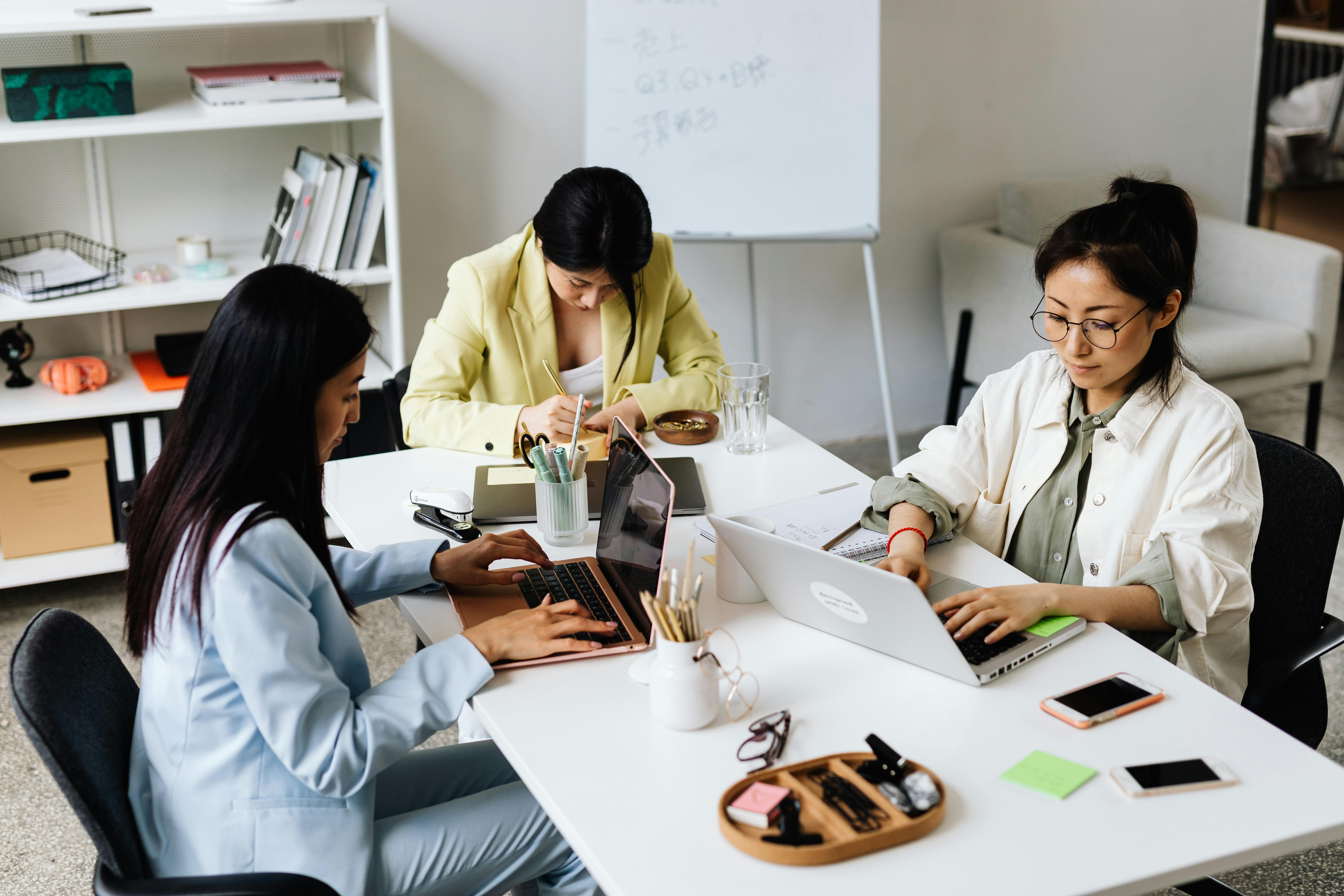 Women using Laptop while Working · Free Stock Photo