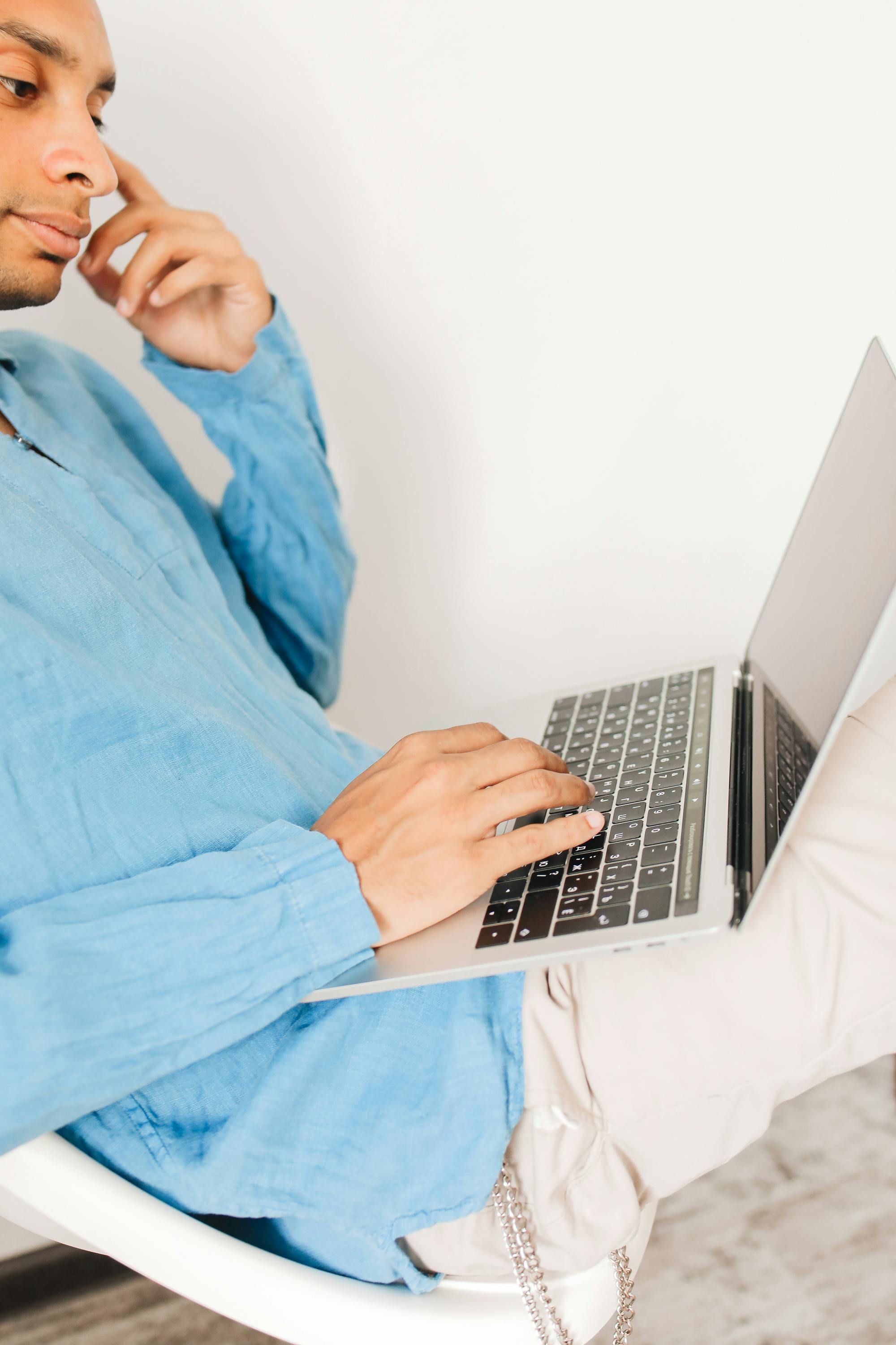A Person Holding a laptop · Free Stock Photo