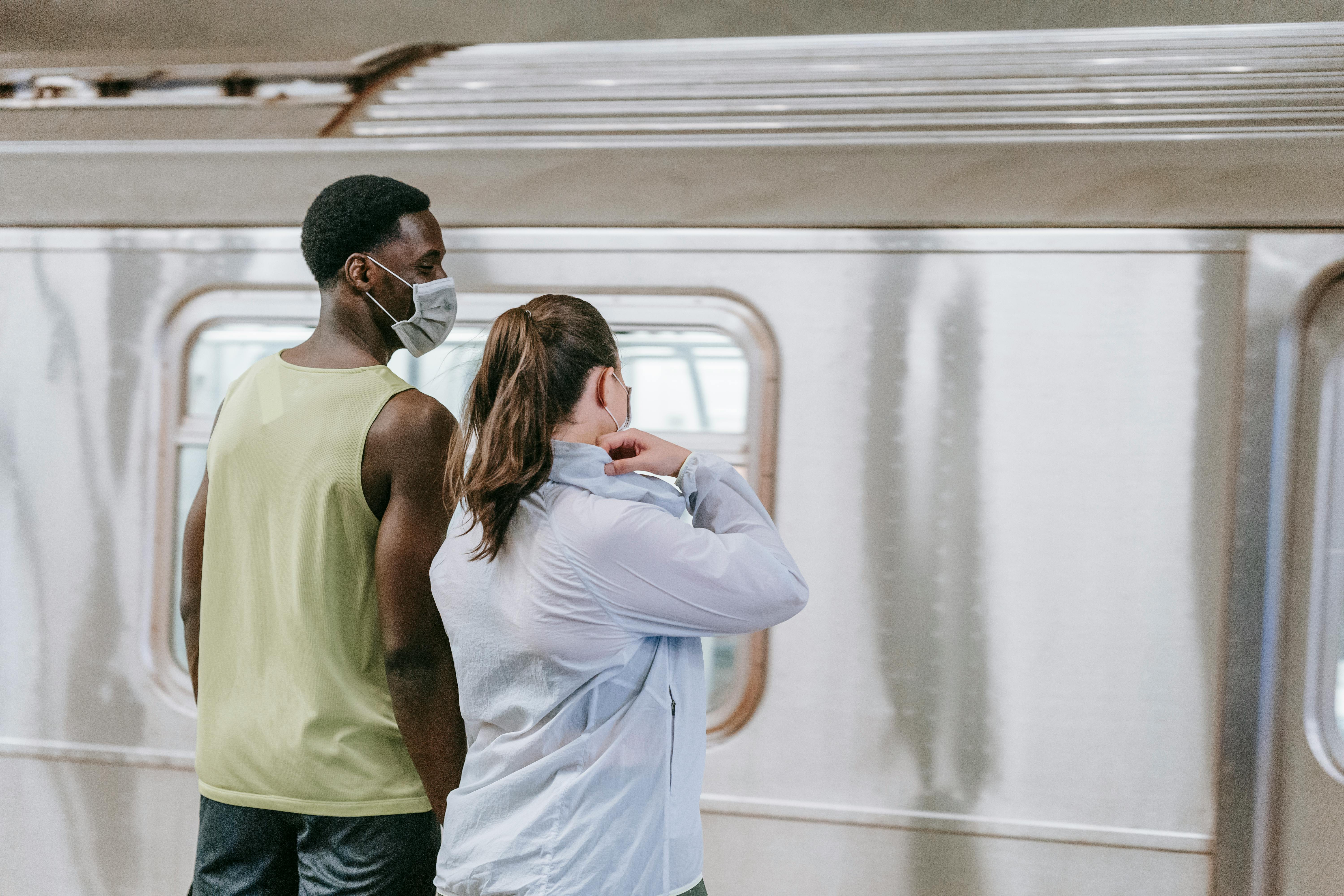 People Standing by a Train · Free Stock Photo