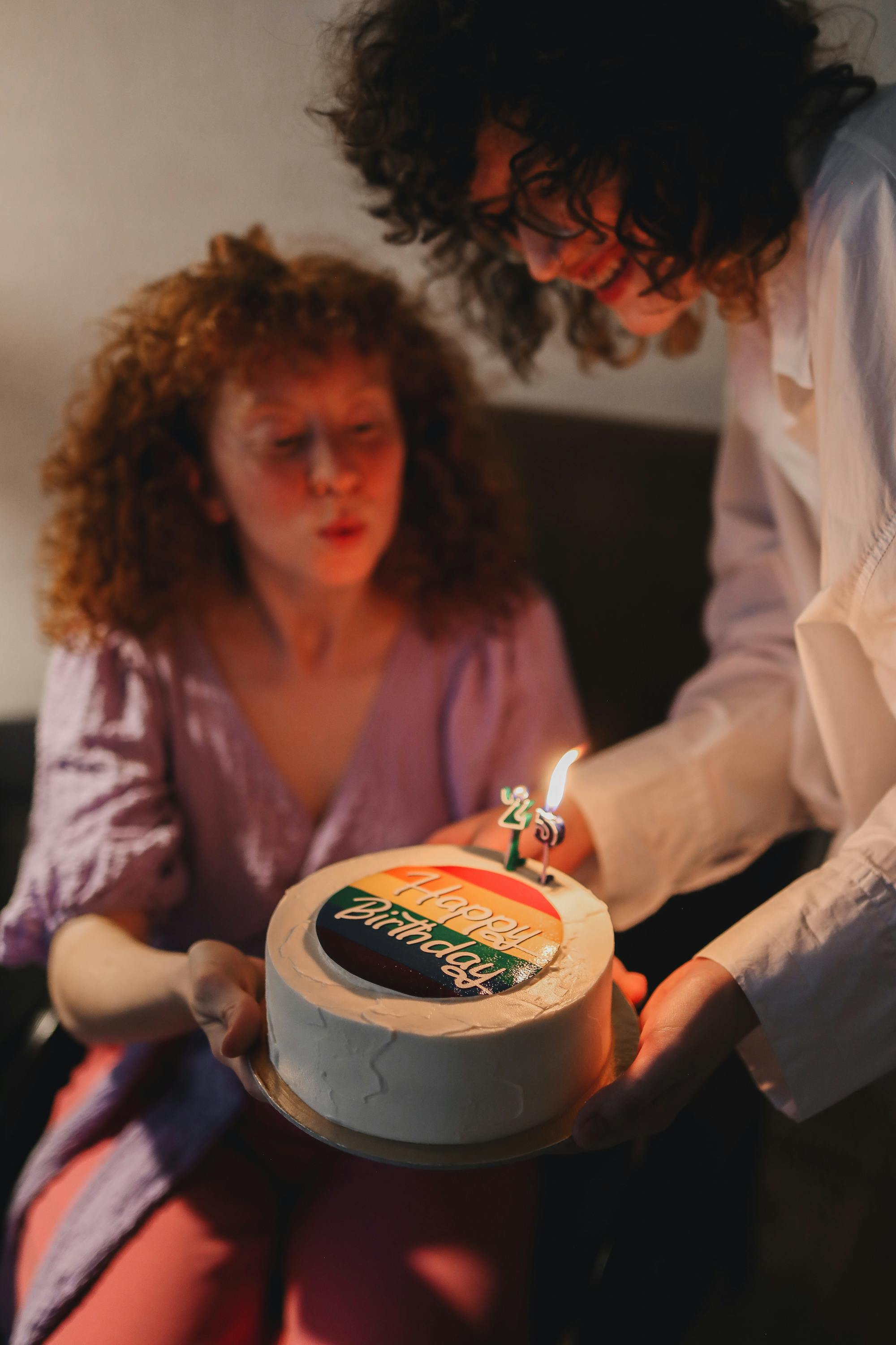 A Person Holding a Cake · Free Stock Photo