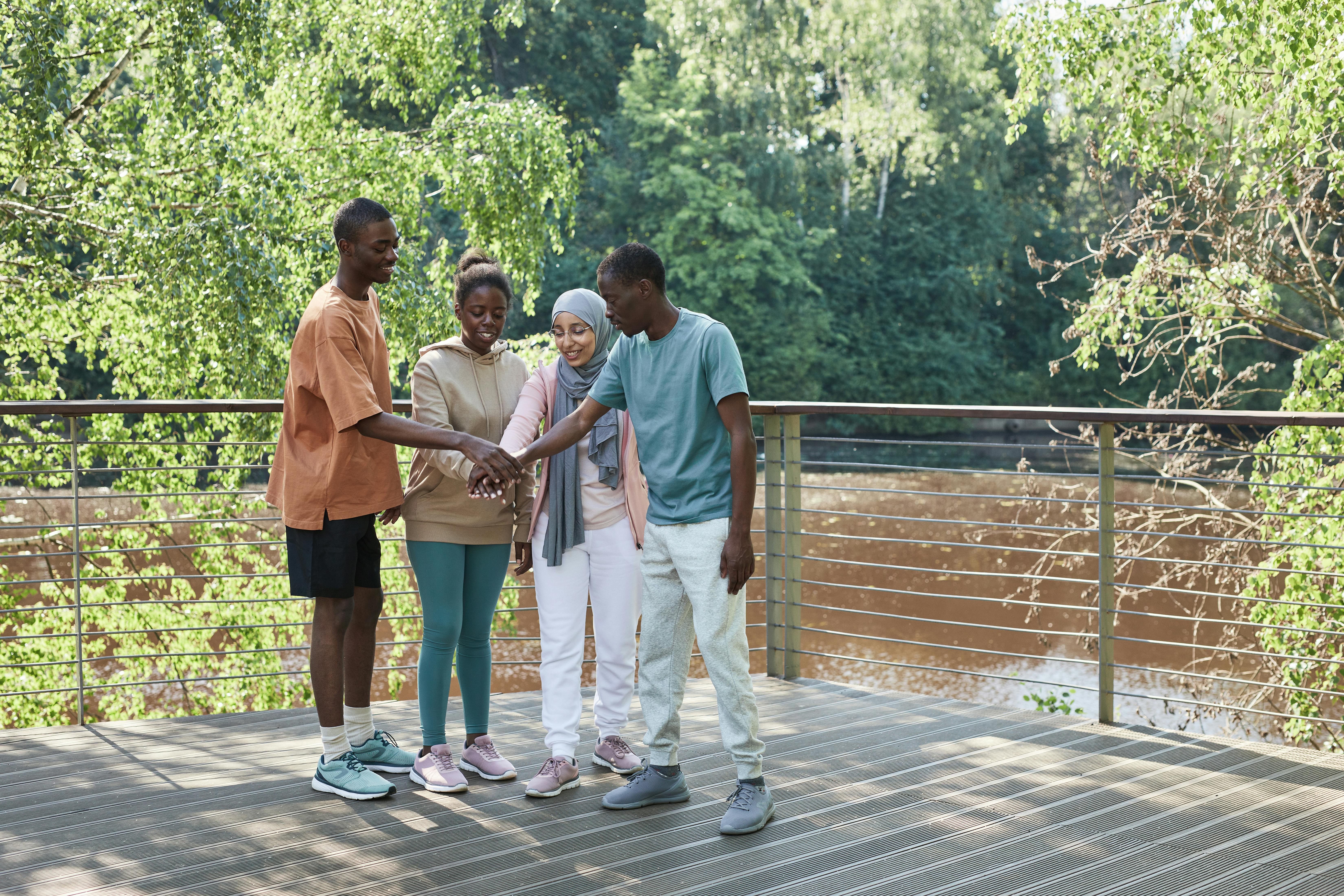 Friends Huddling Up · Free Stock Photo