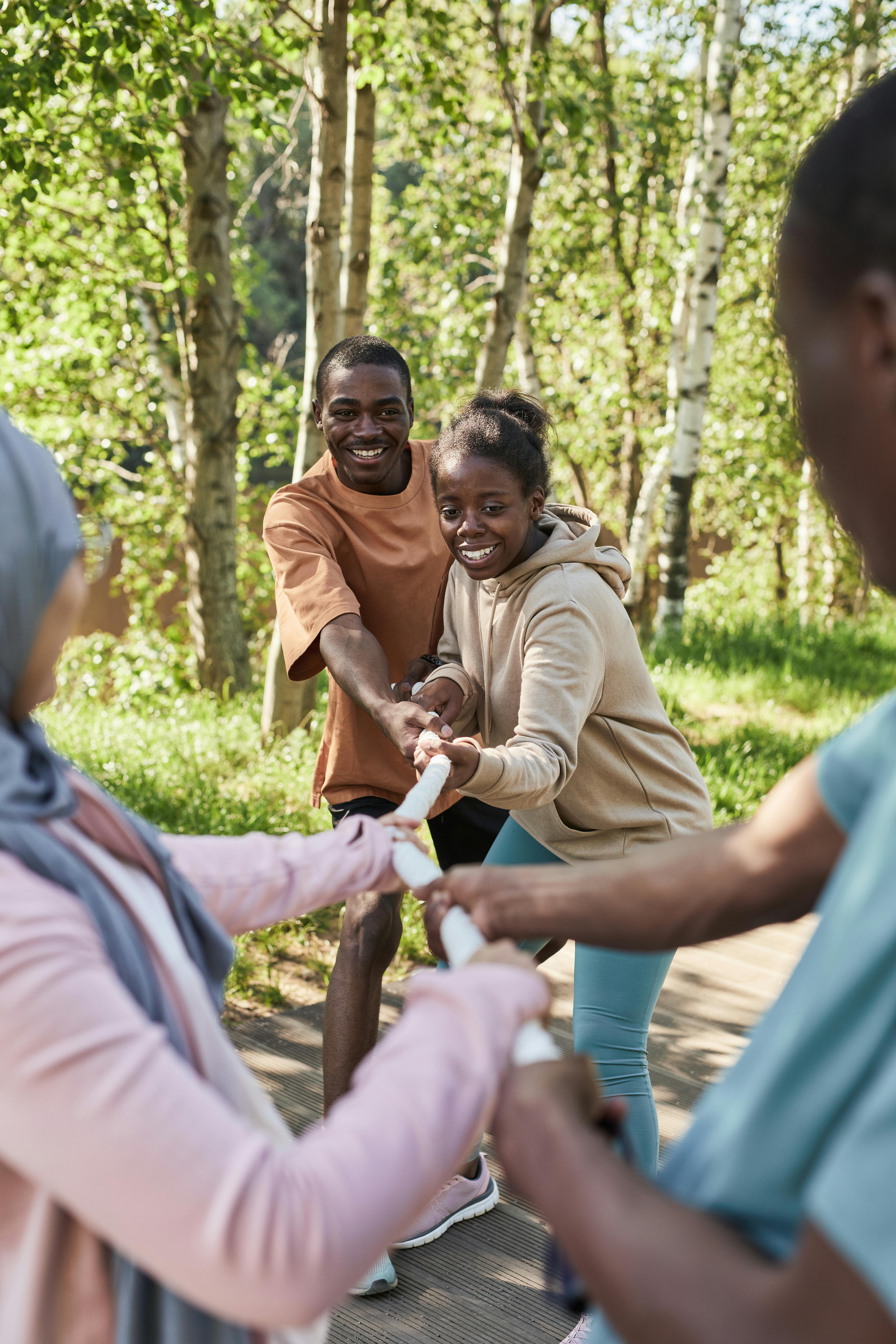 Man And Woman Playing Tug-of-war · Free Stock Photo