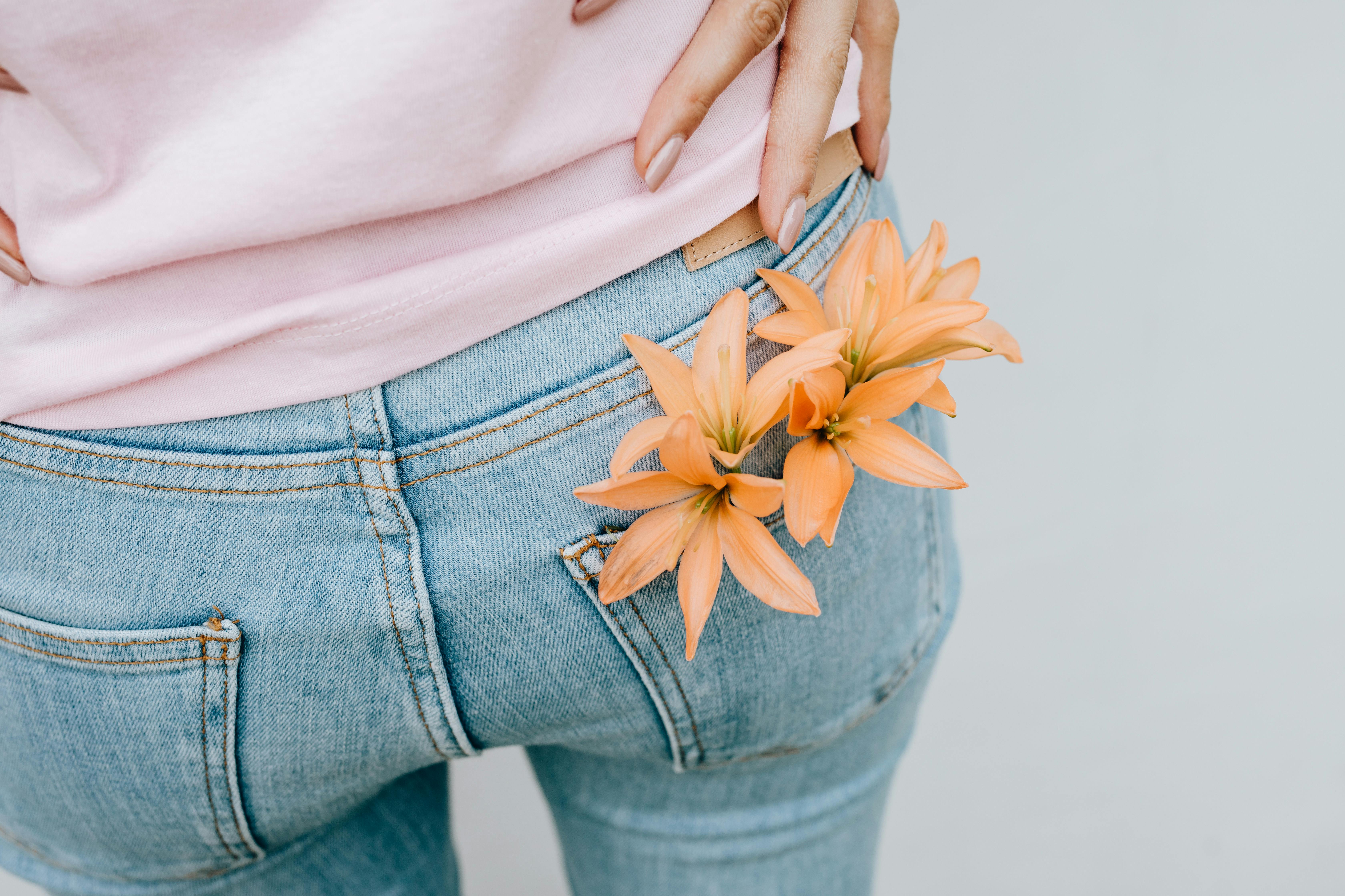 Close up of Flowers in Woman Pocket · Free Stock Photo