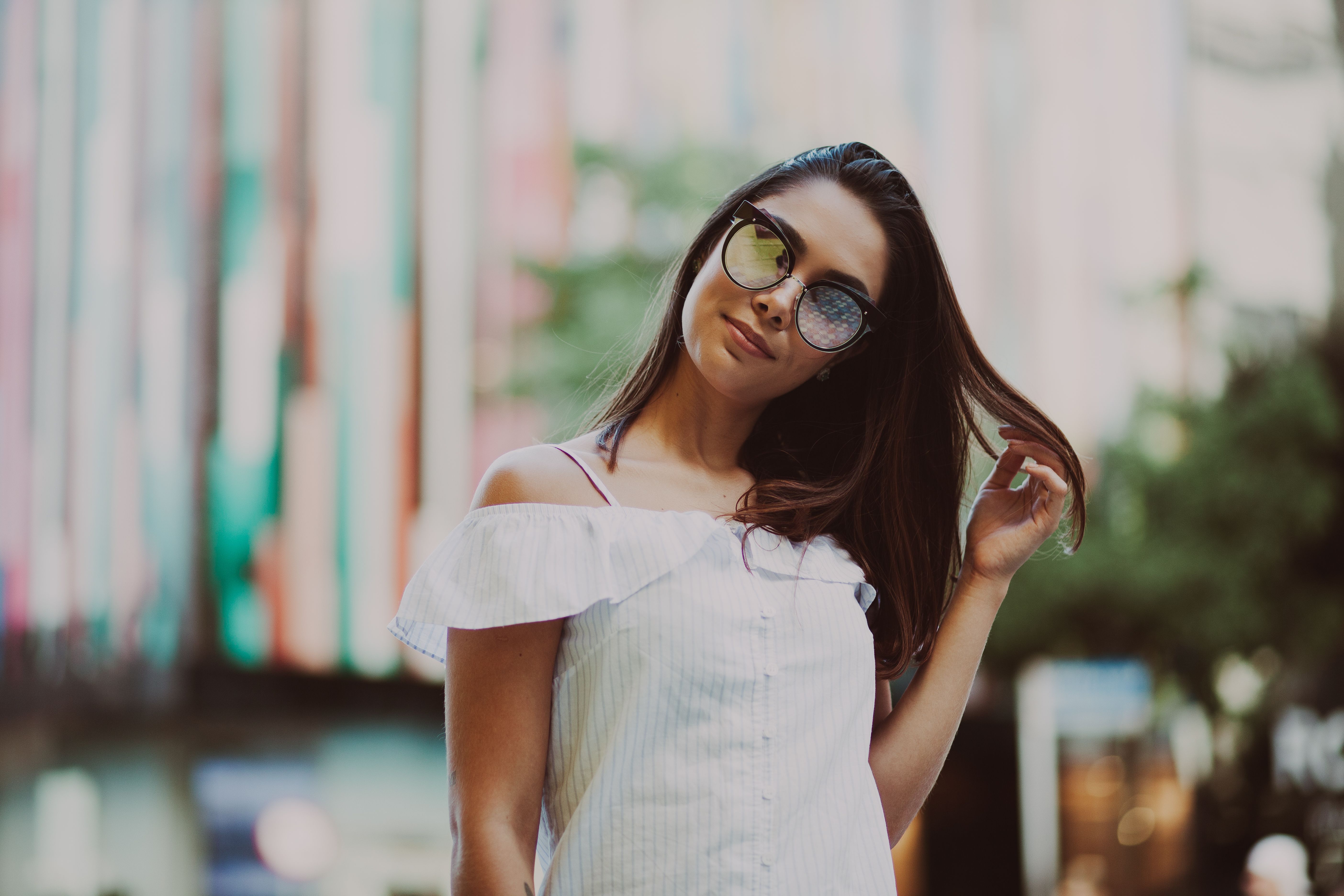 Girl Wearing a White Off Shoulder Top and Denim Shorts · Free Stock Photo