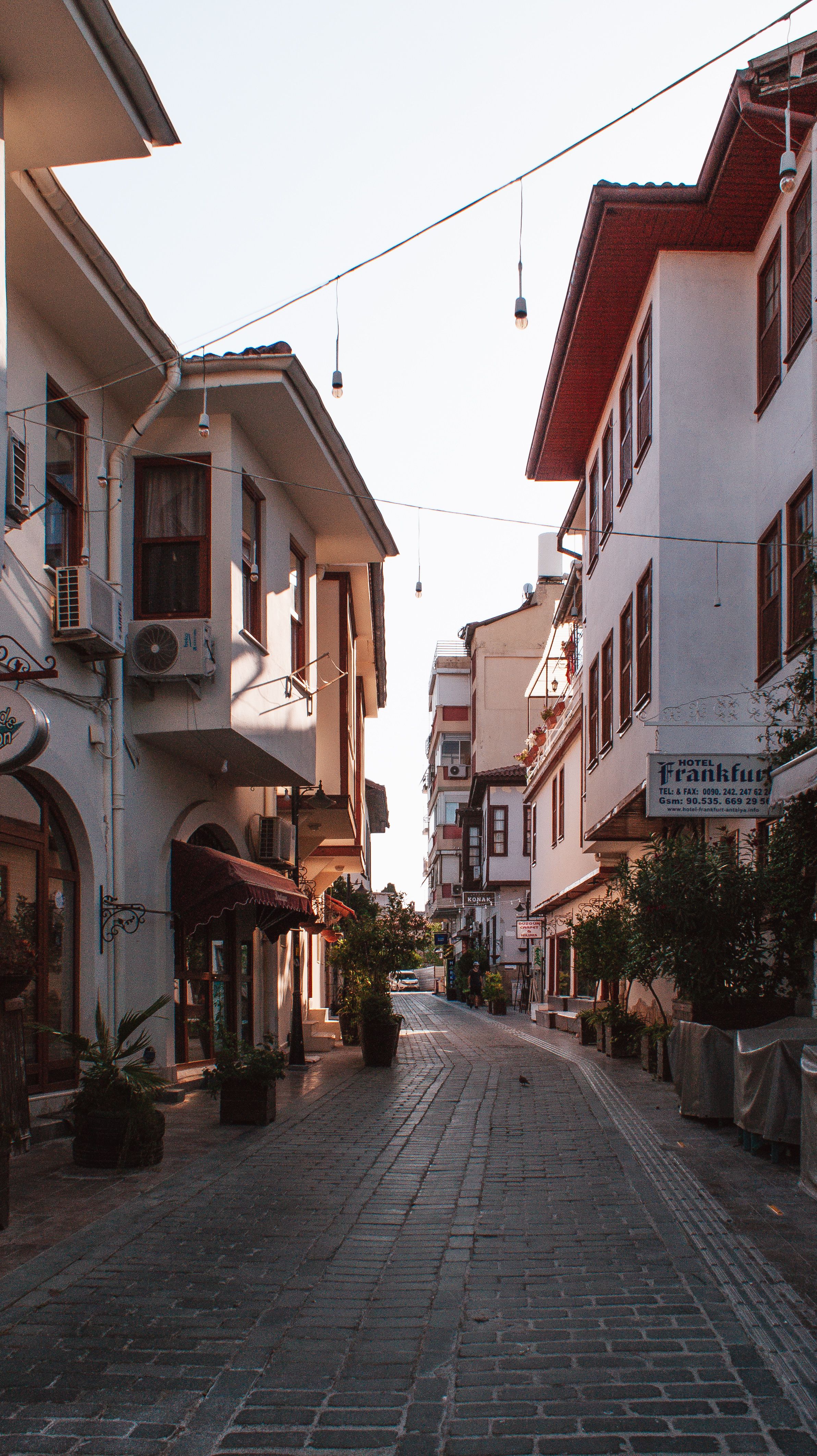 A Street Between Concrete Houses · Free Stock Photo