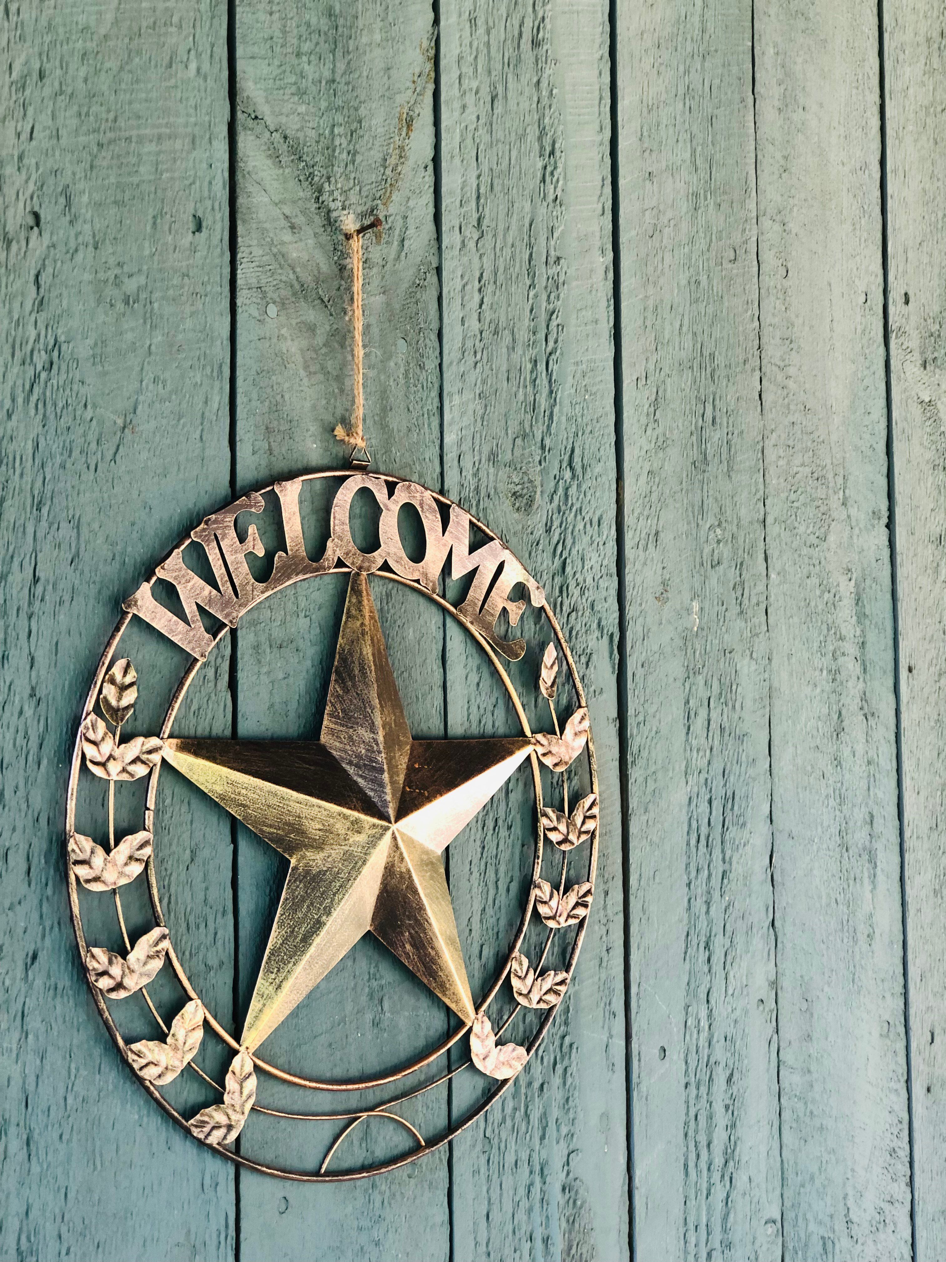 A Hanging Star on the Wooden Wall · Free Stock Photo