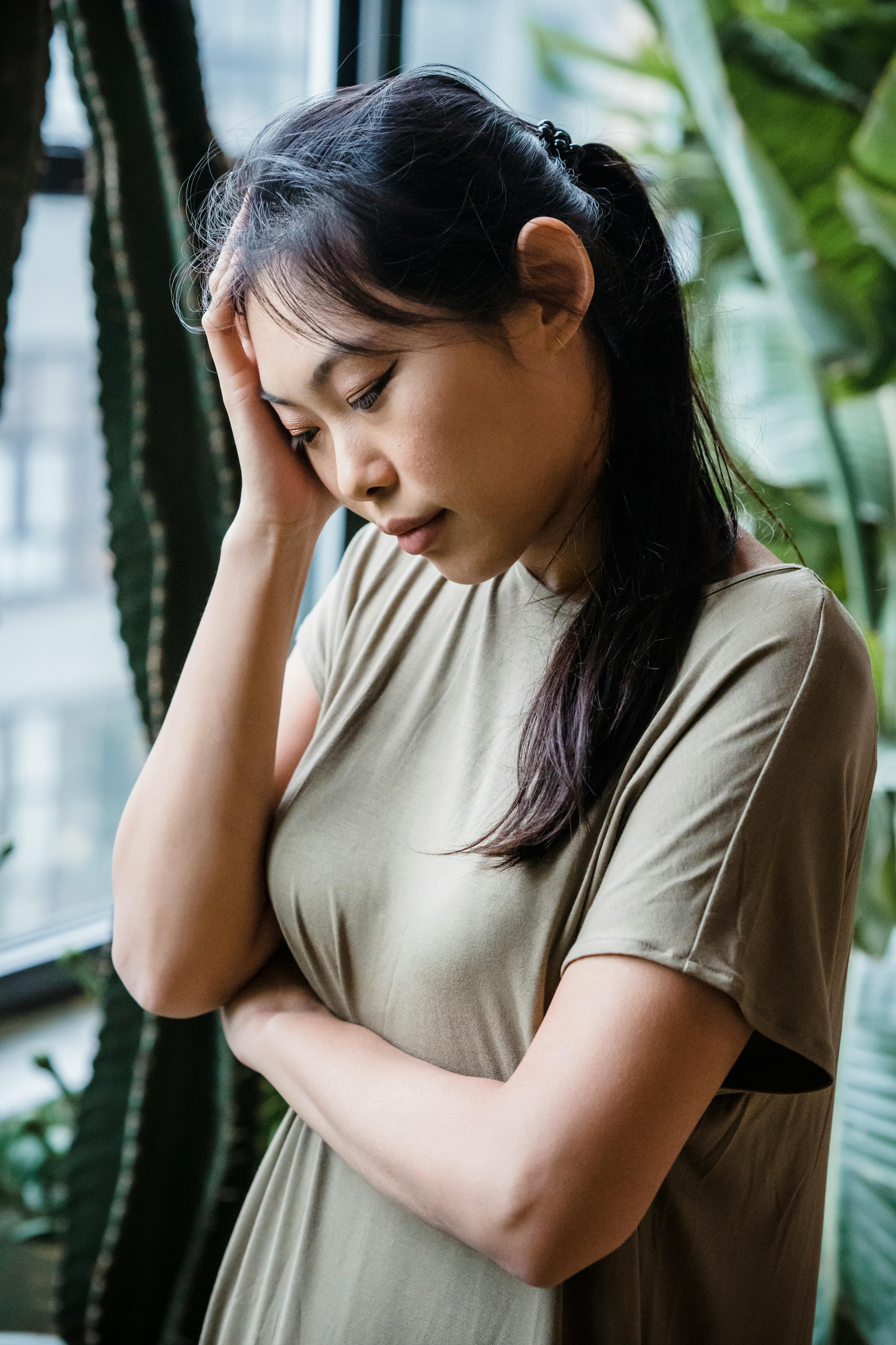 A Problematic Woman in Brown Crew Neck T-shirt · Free Stock Photo