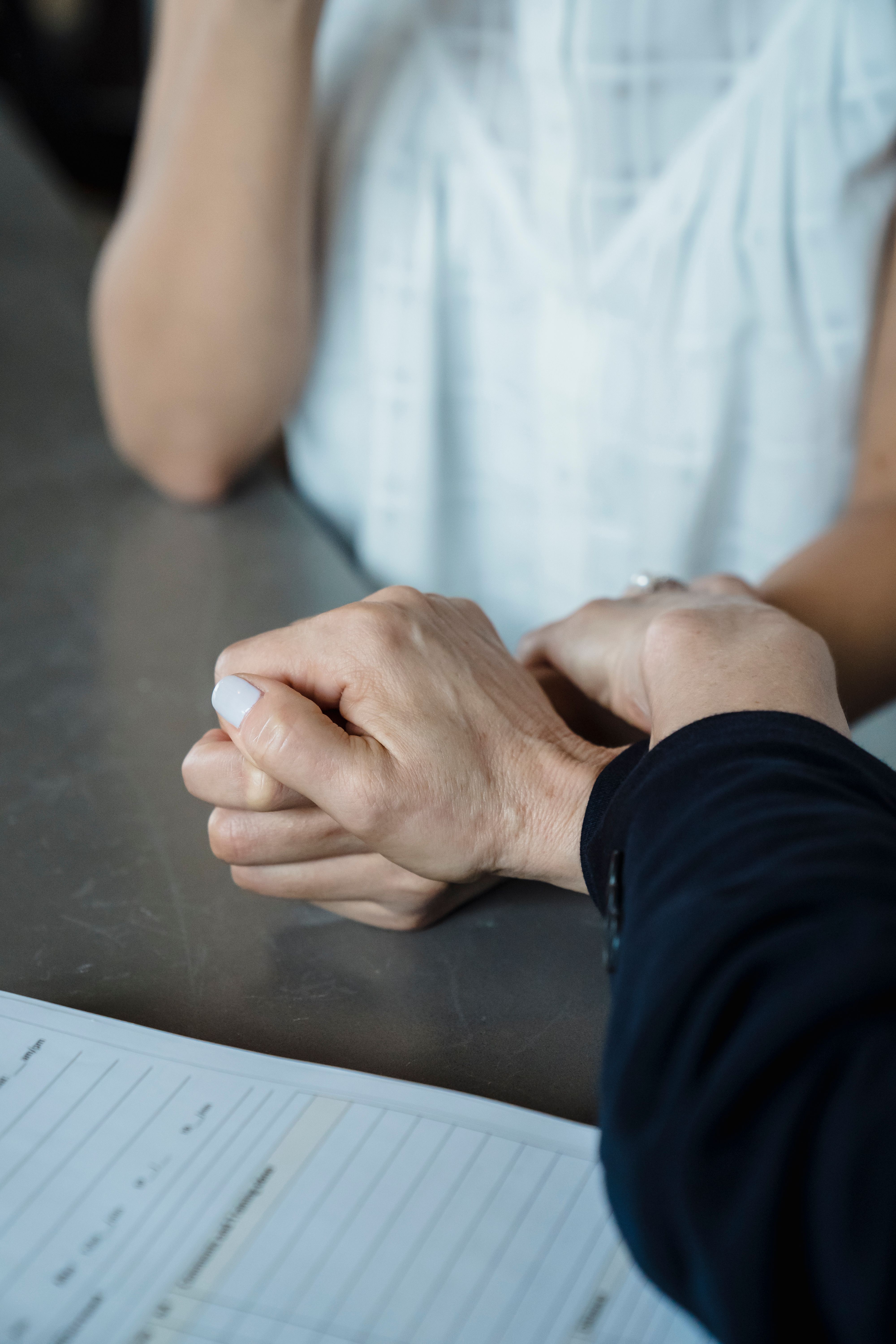 A Person Holding Another Person's Hand · Free Stock Photo