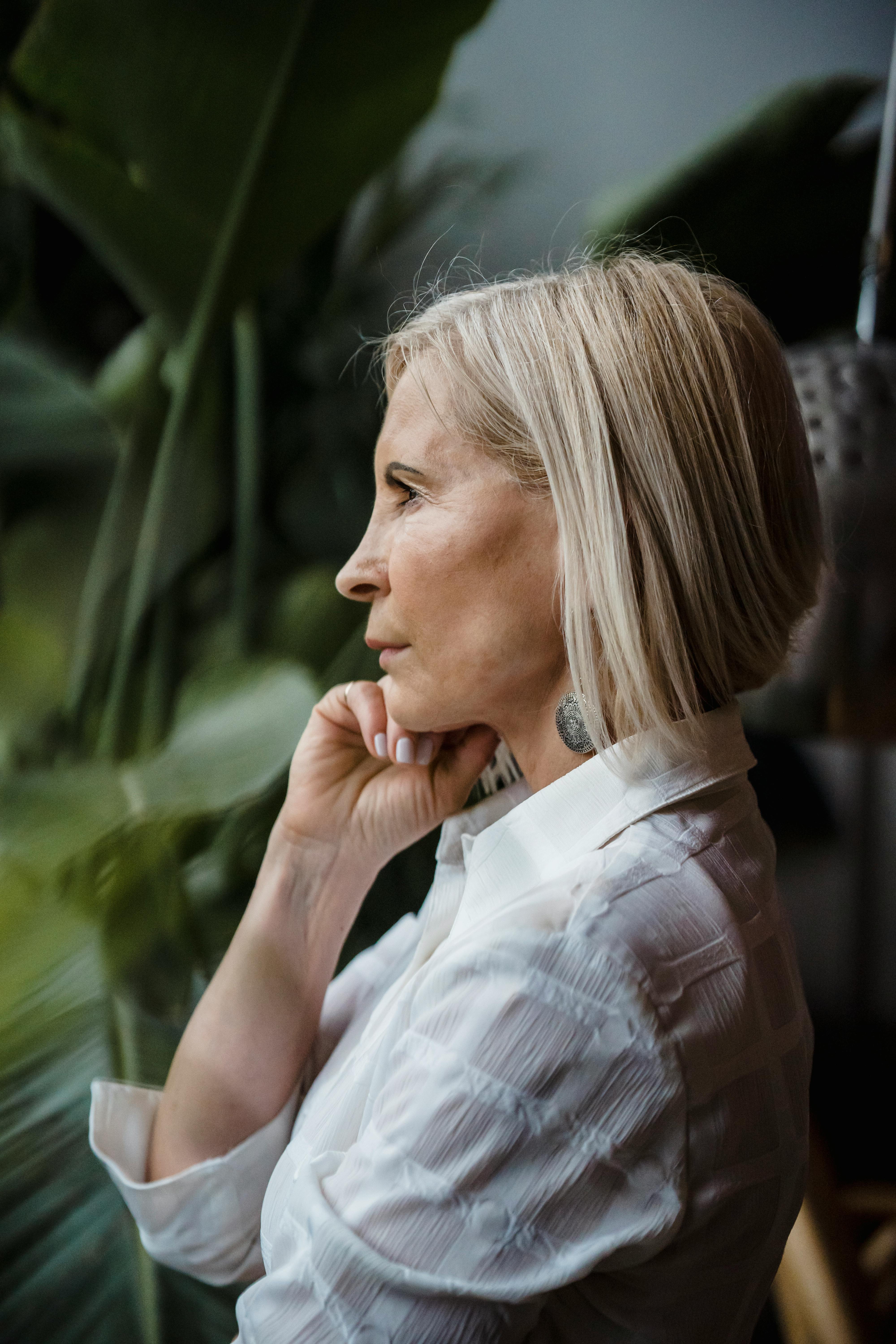 Portrait of a Woman Thinking · Free Stock Photo