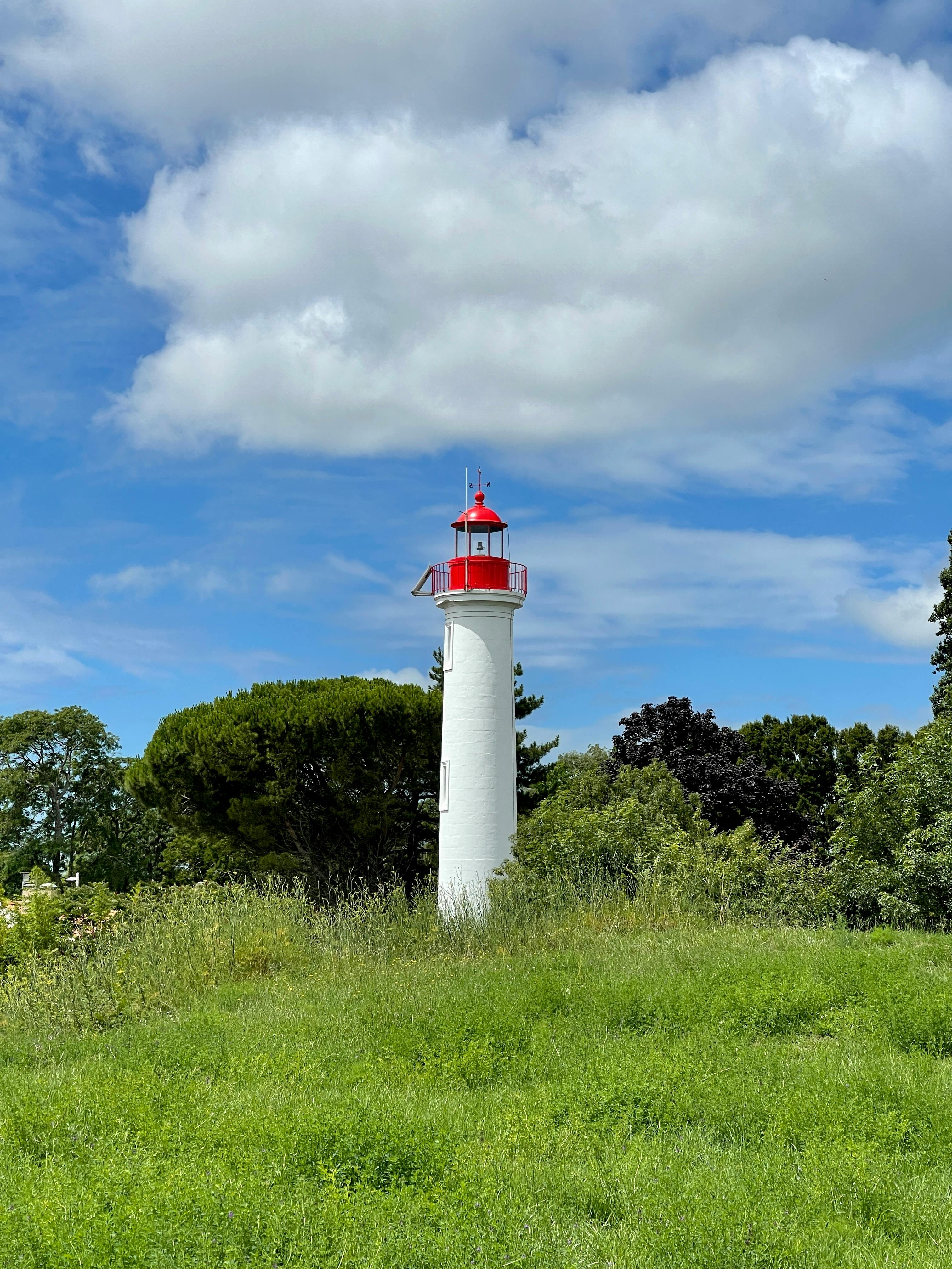 White and Red Lighthouse · Free Stock Photo