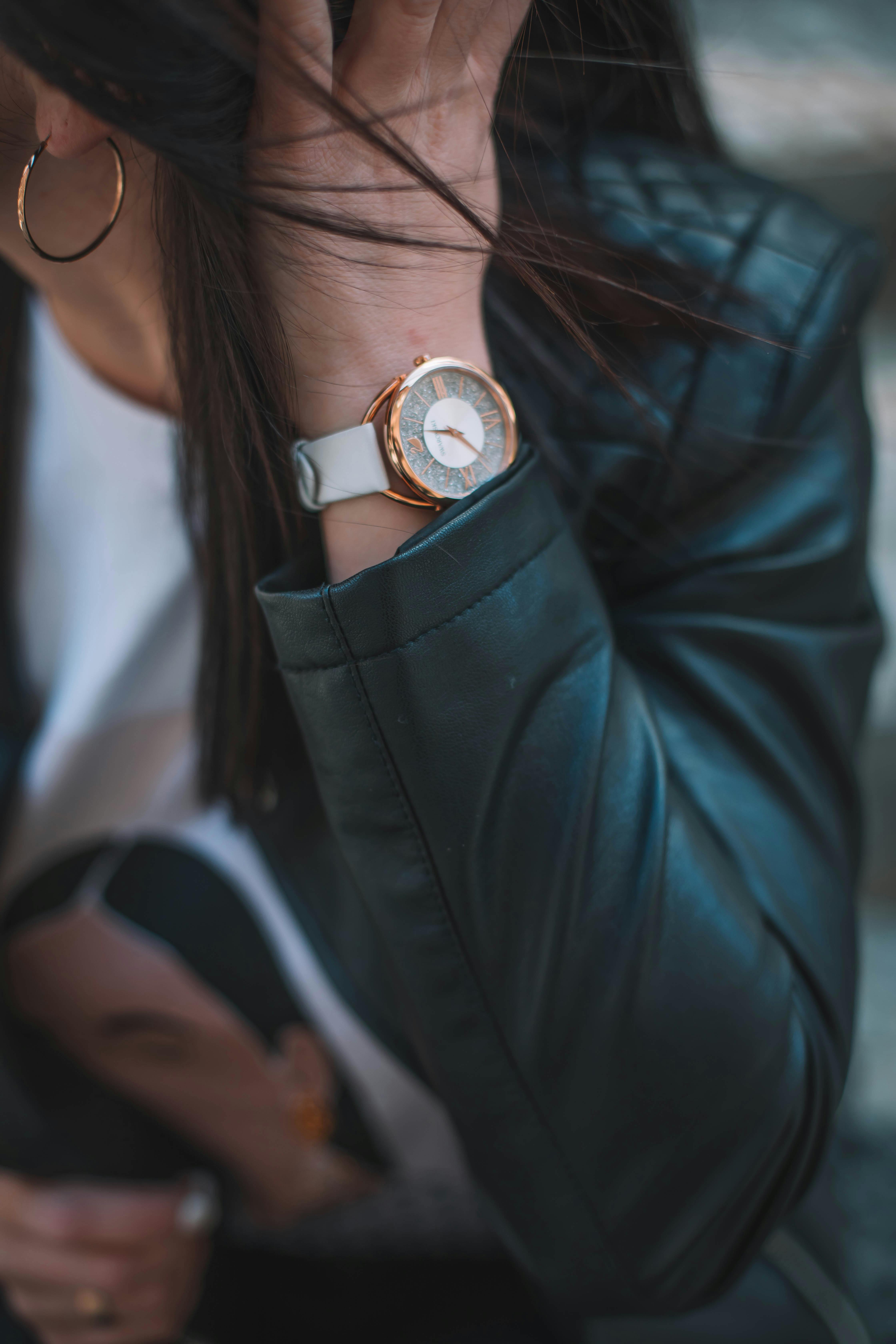White Watch on Hand in Black Leather Sleeve · Free Stock Photo