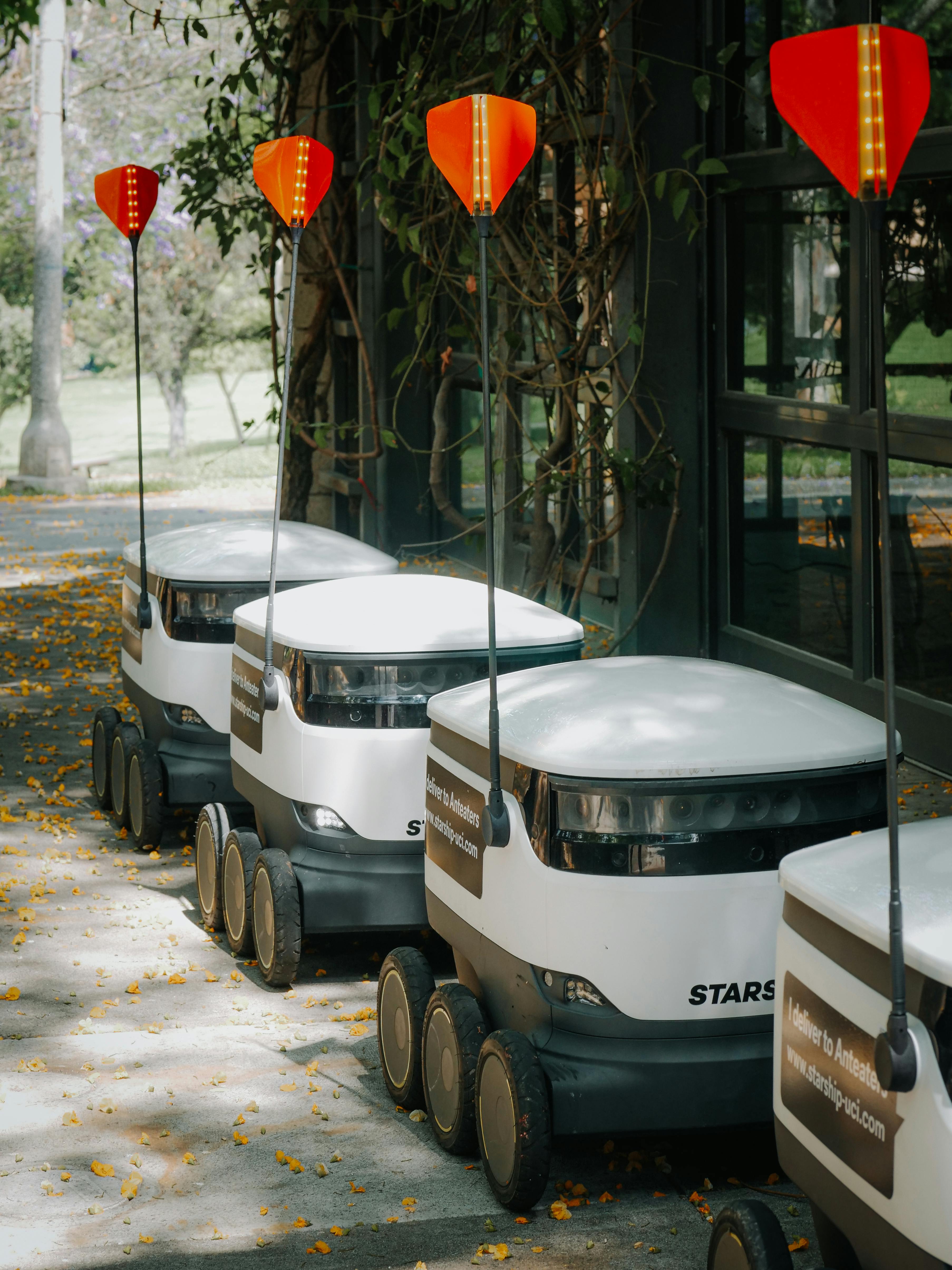 Delivery Robot on Pavement · Free Stock Photo