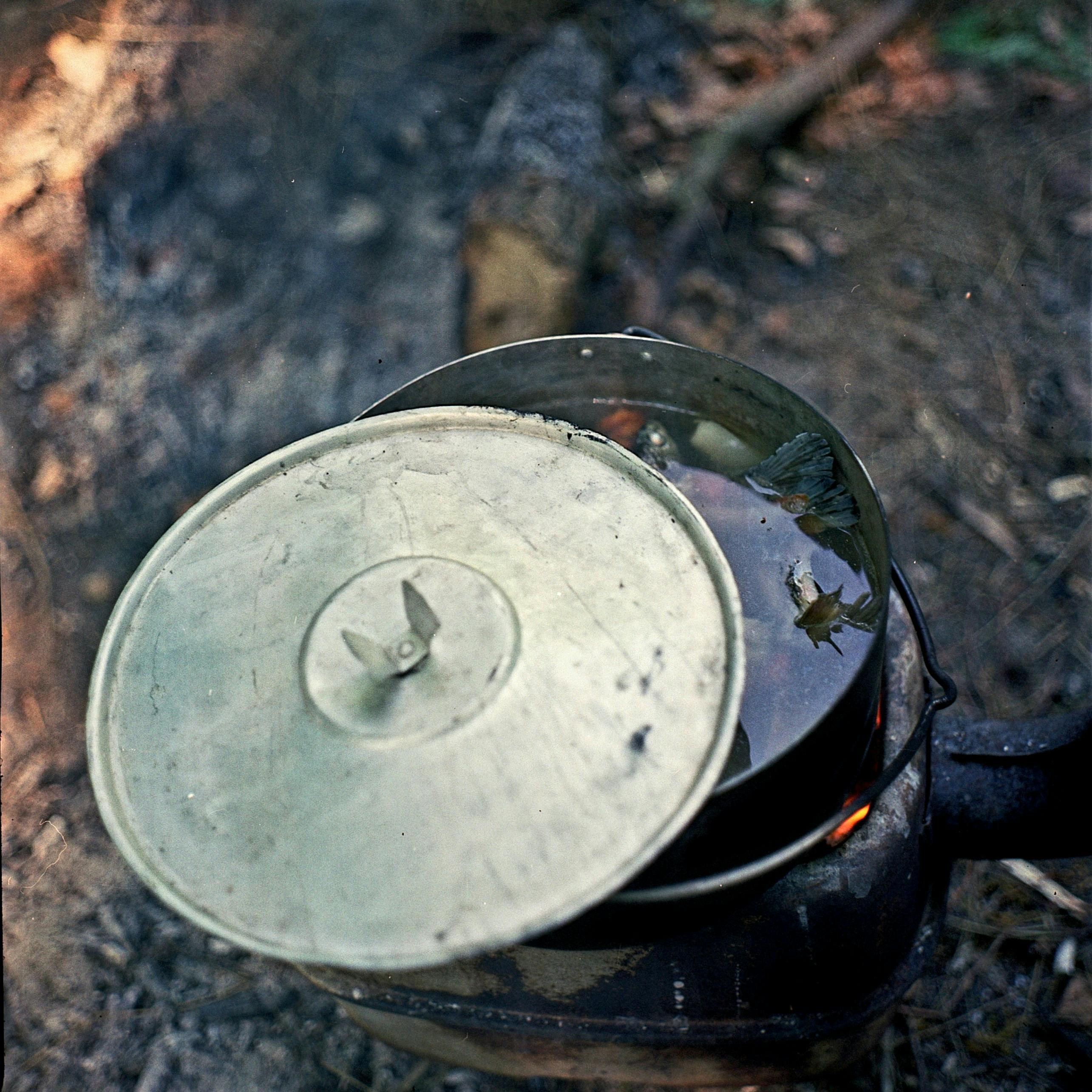Close-up of an Iron Cauldron for Outdoor Cooking · Free Stock Photo