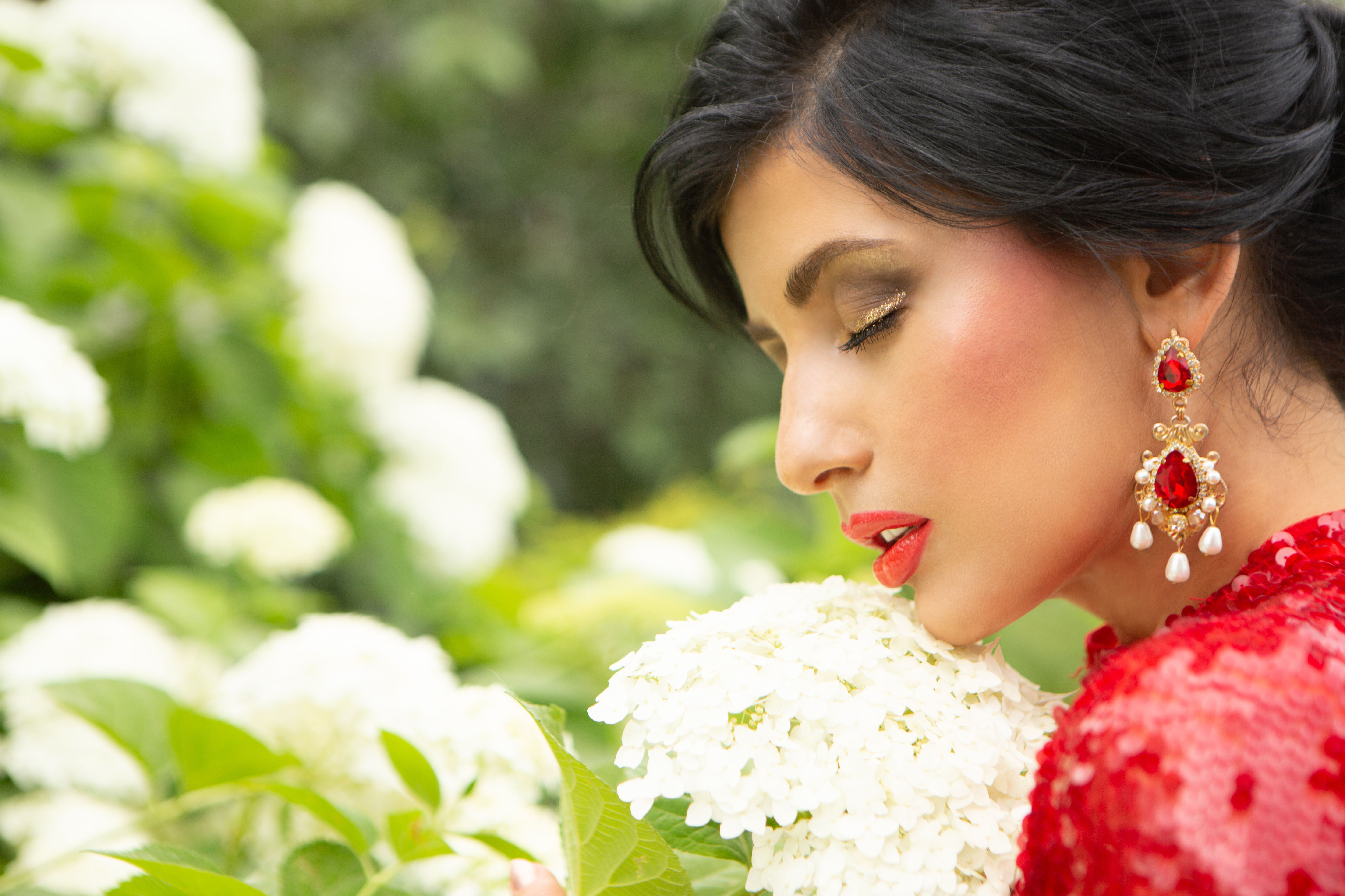 Woman Smelling Flowers · Free Stock Photo