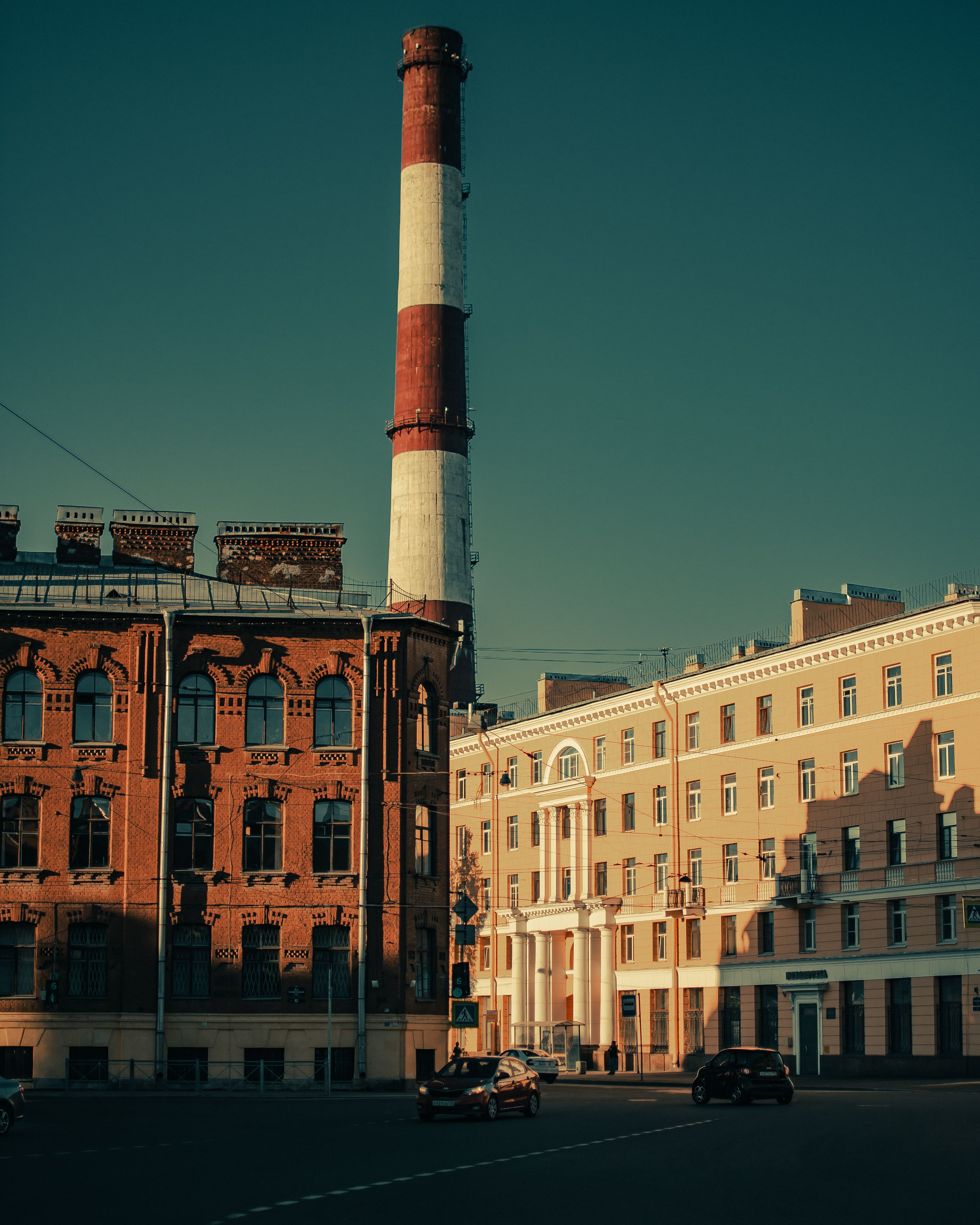 Red and White Factory Chimney Under Blue Sky · Free Stock Photo
