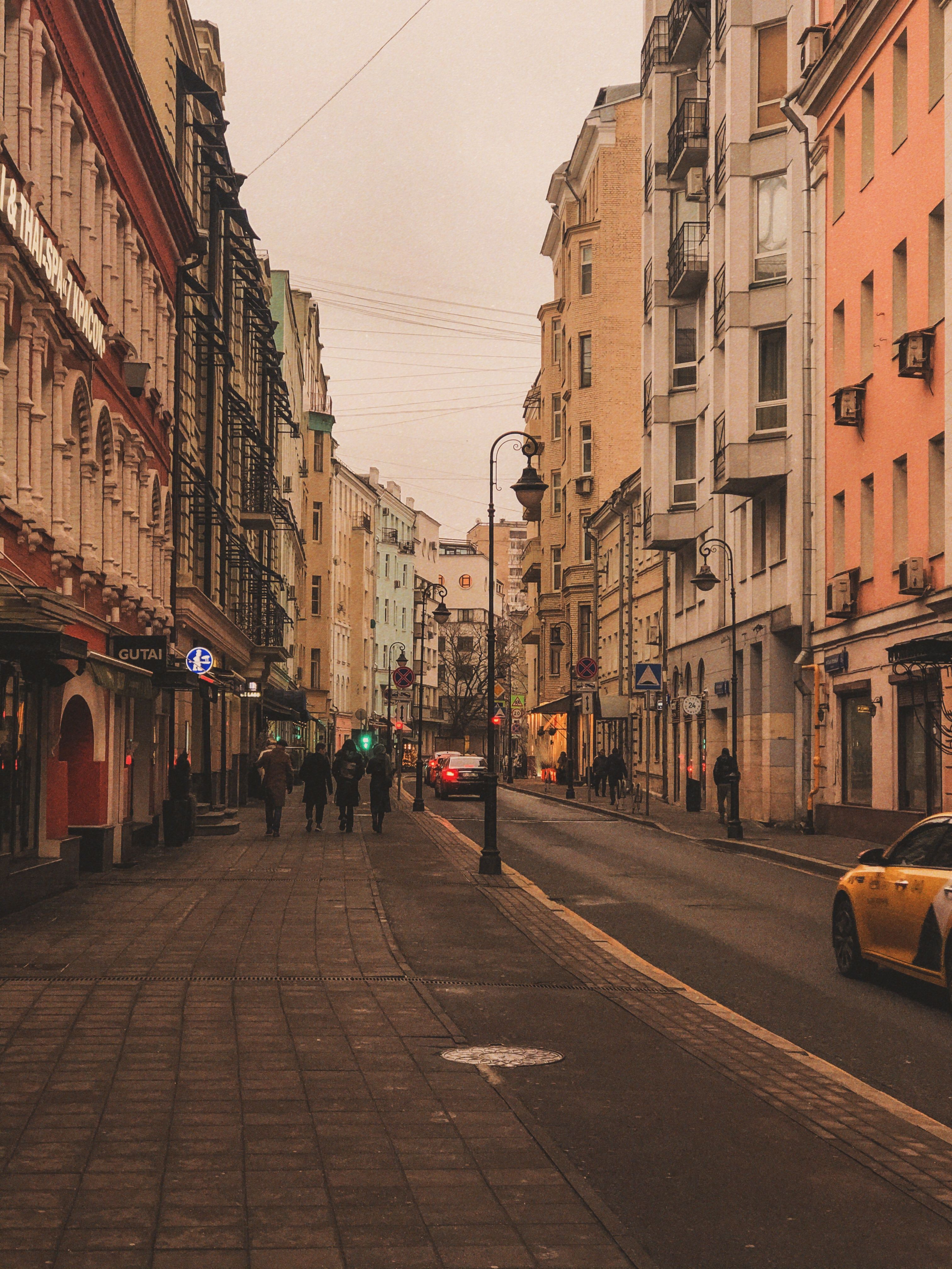 City Street Between Apartment Buildings · Free Stock Photo