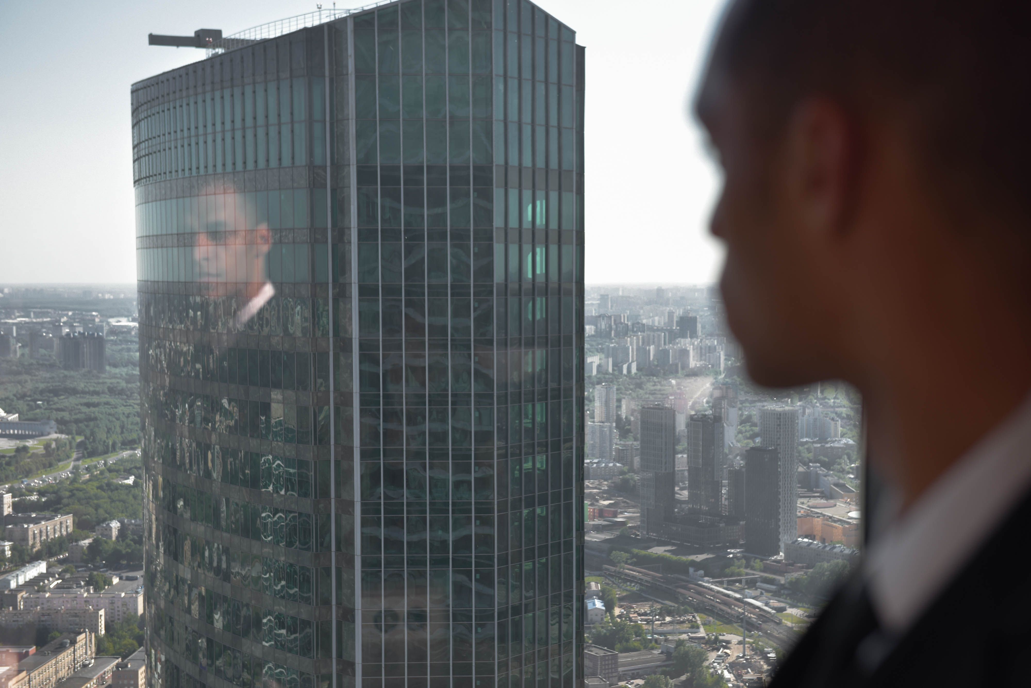 A Reflection of a Man on a Glass Window Looking at the View · Free ...