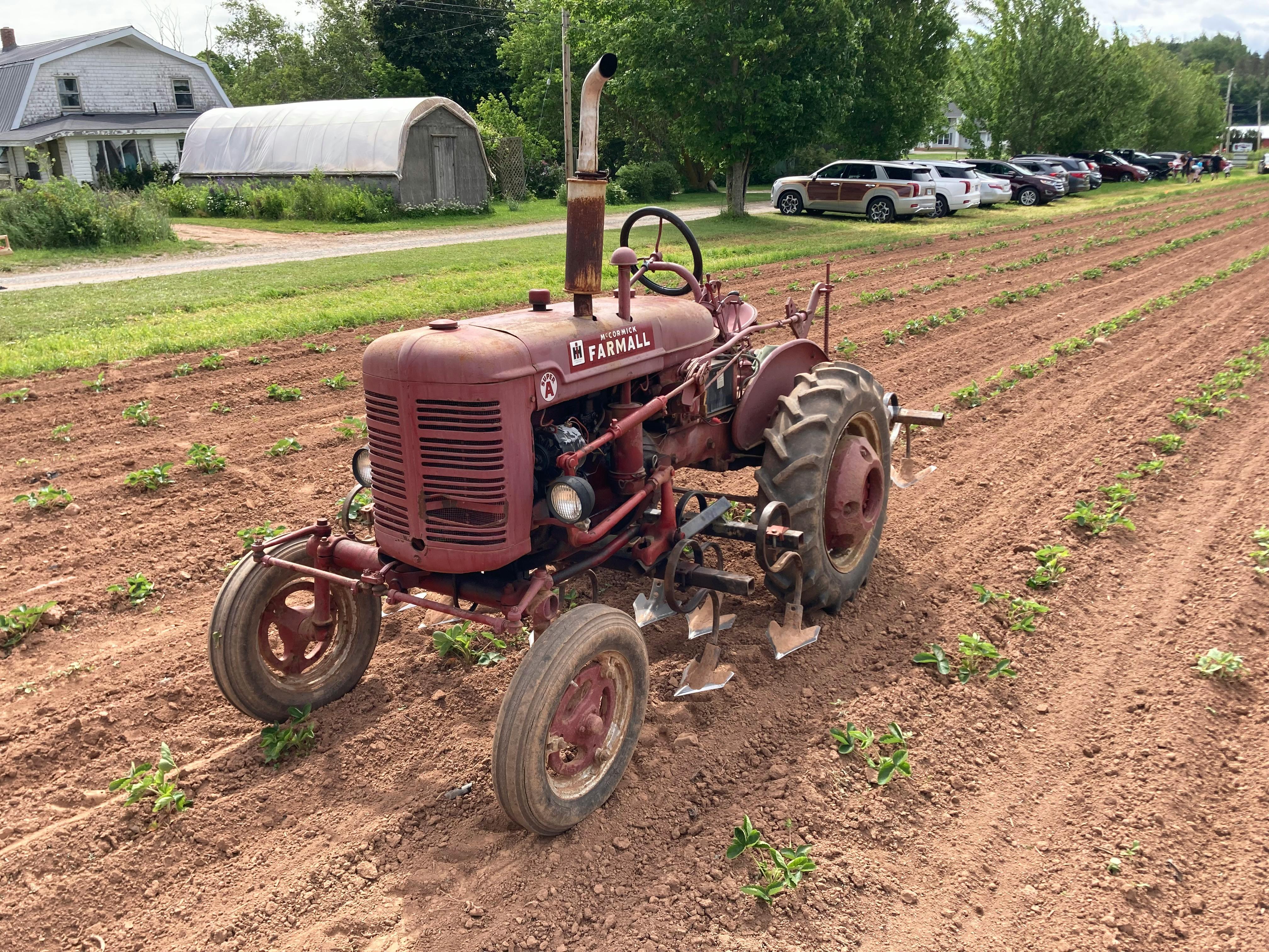 Parked Tractor on Field · Free Stock Photo