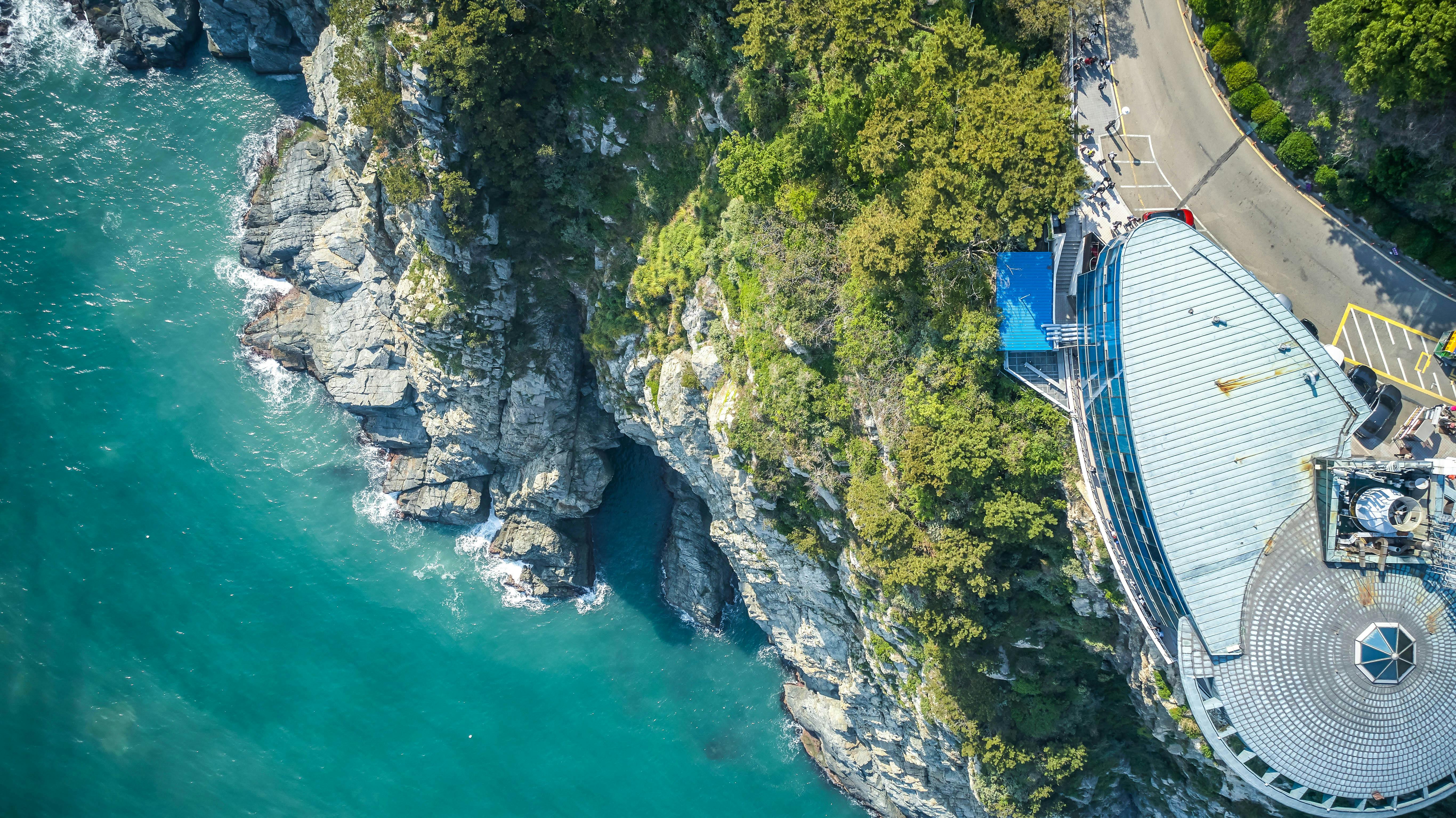 An Aerial Photography of a Rock Formation Near the Ocean · Free Stock Photo