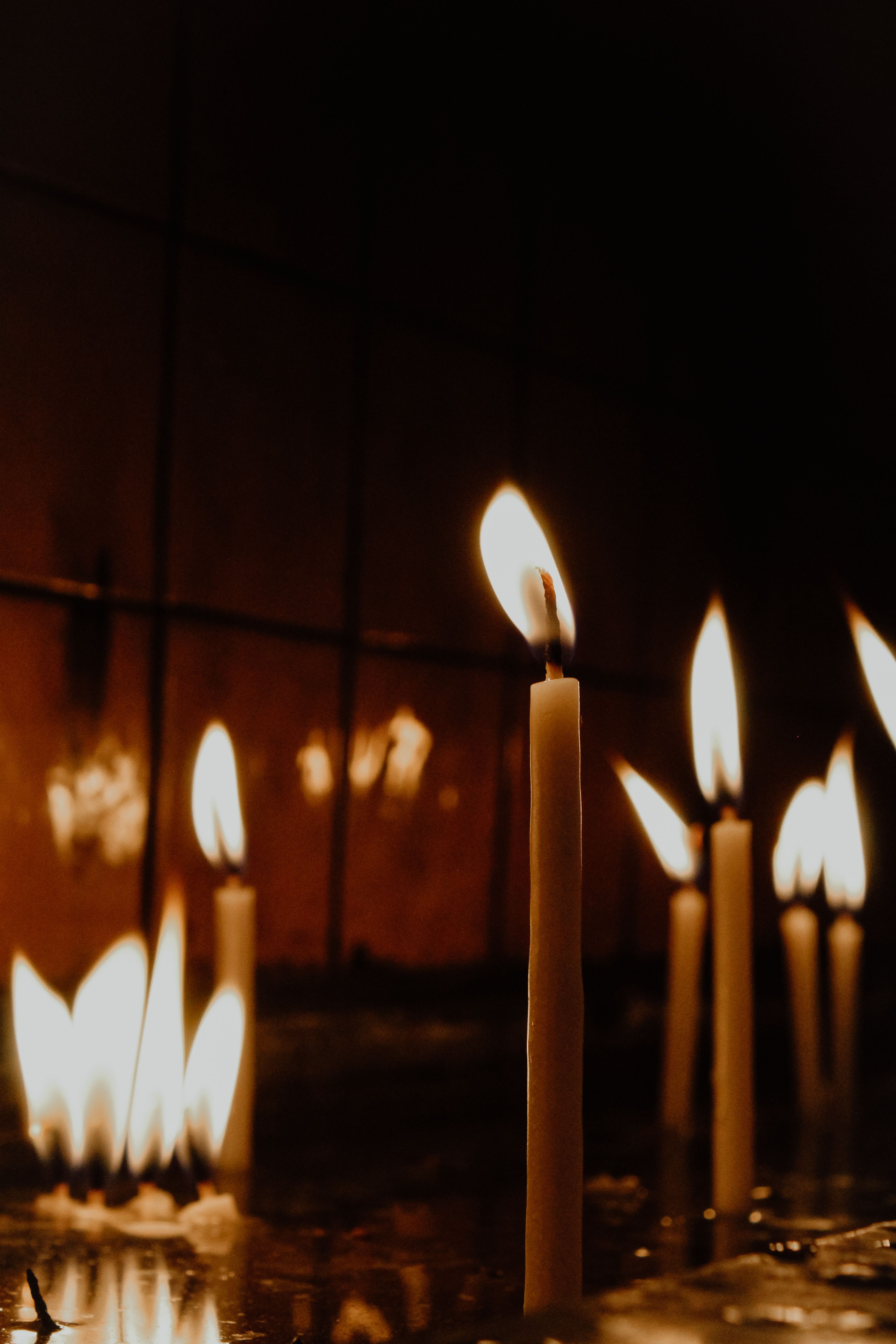 Close-Up Shot of a Lighted Candle · Free Stock Photo