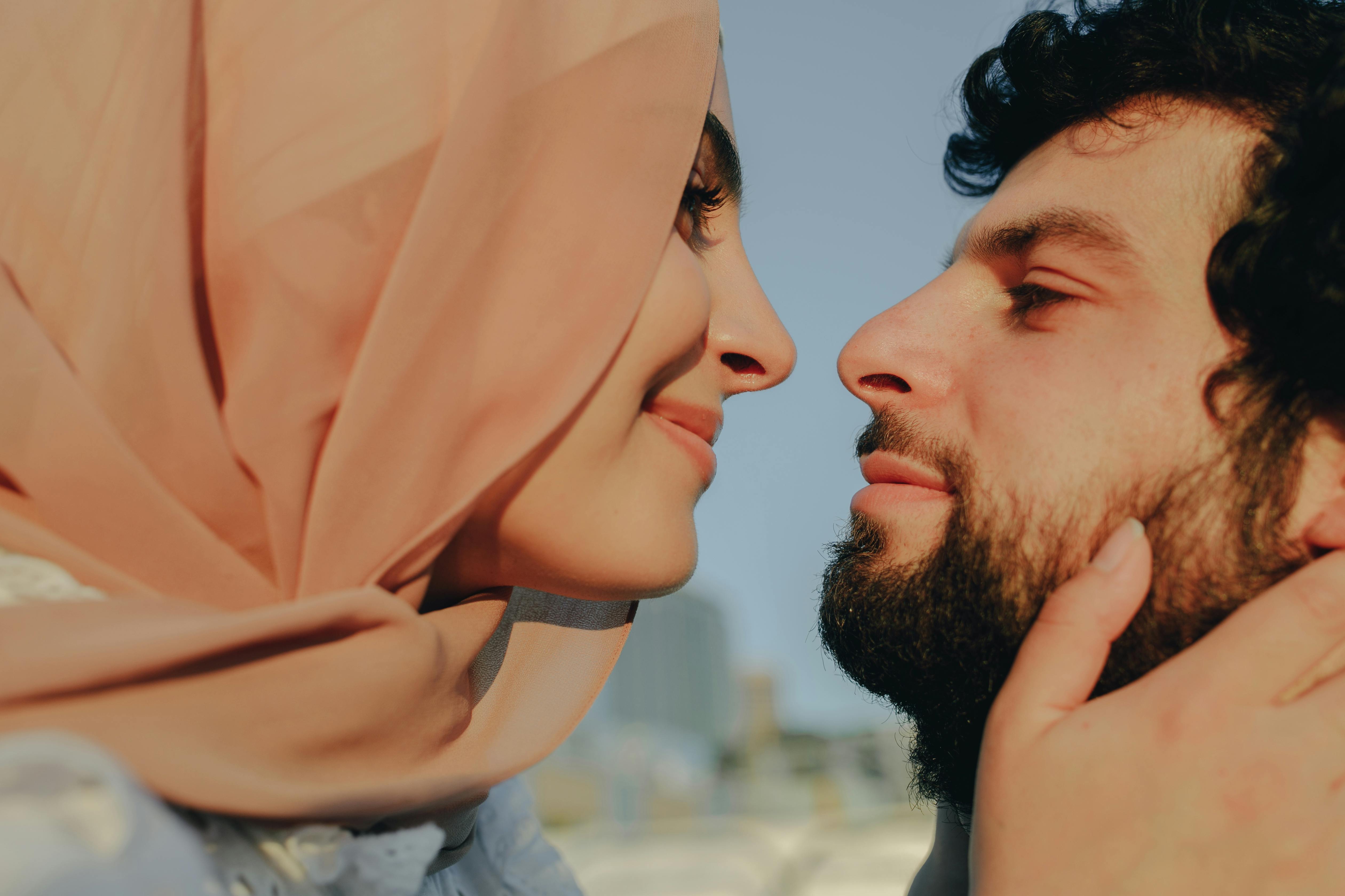 View of Couple Holding Hands · Free Stock Photo