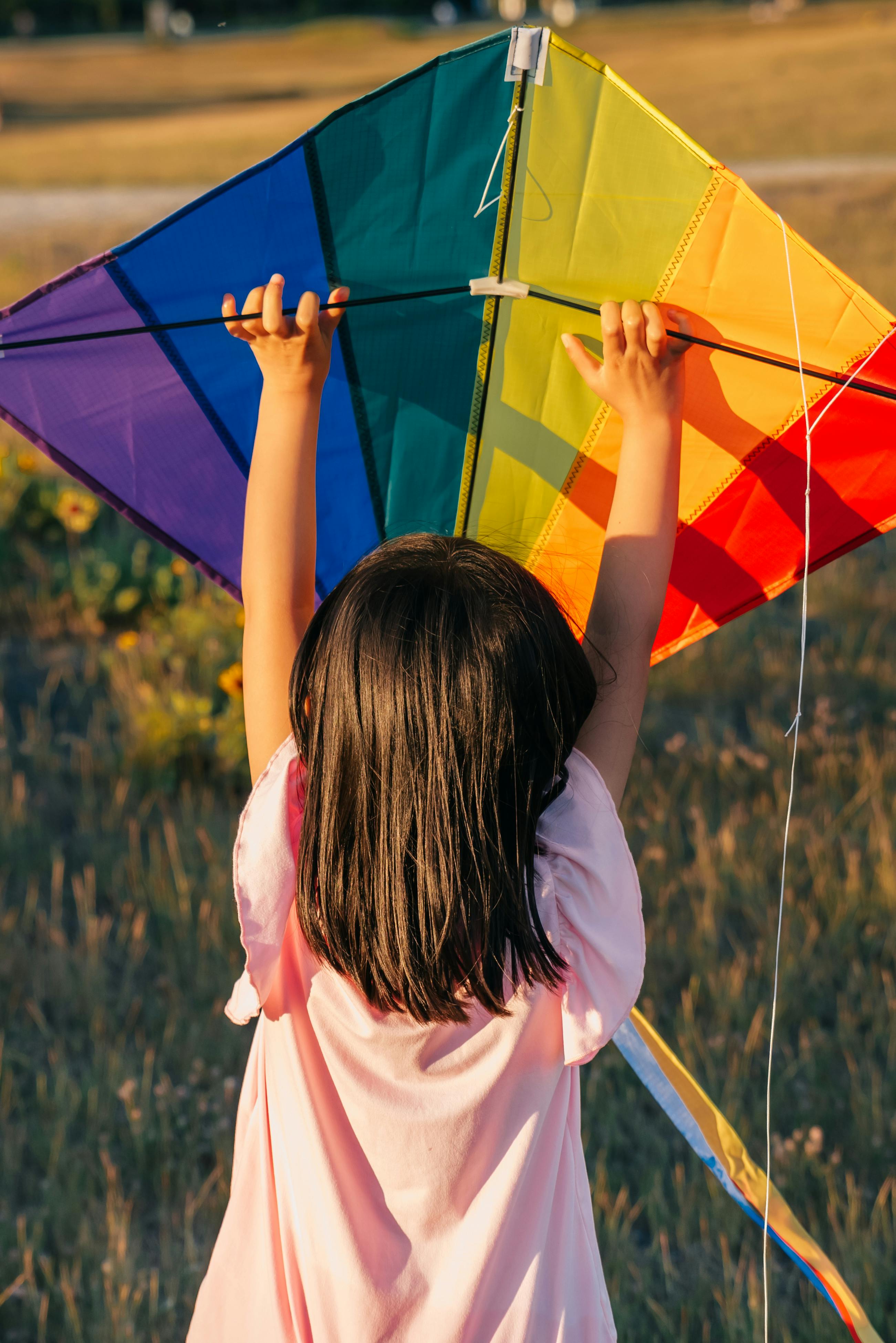 Woman and Child Playing Kite · Free Stock Photo