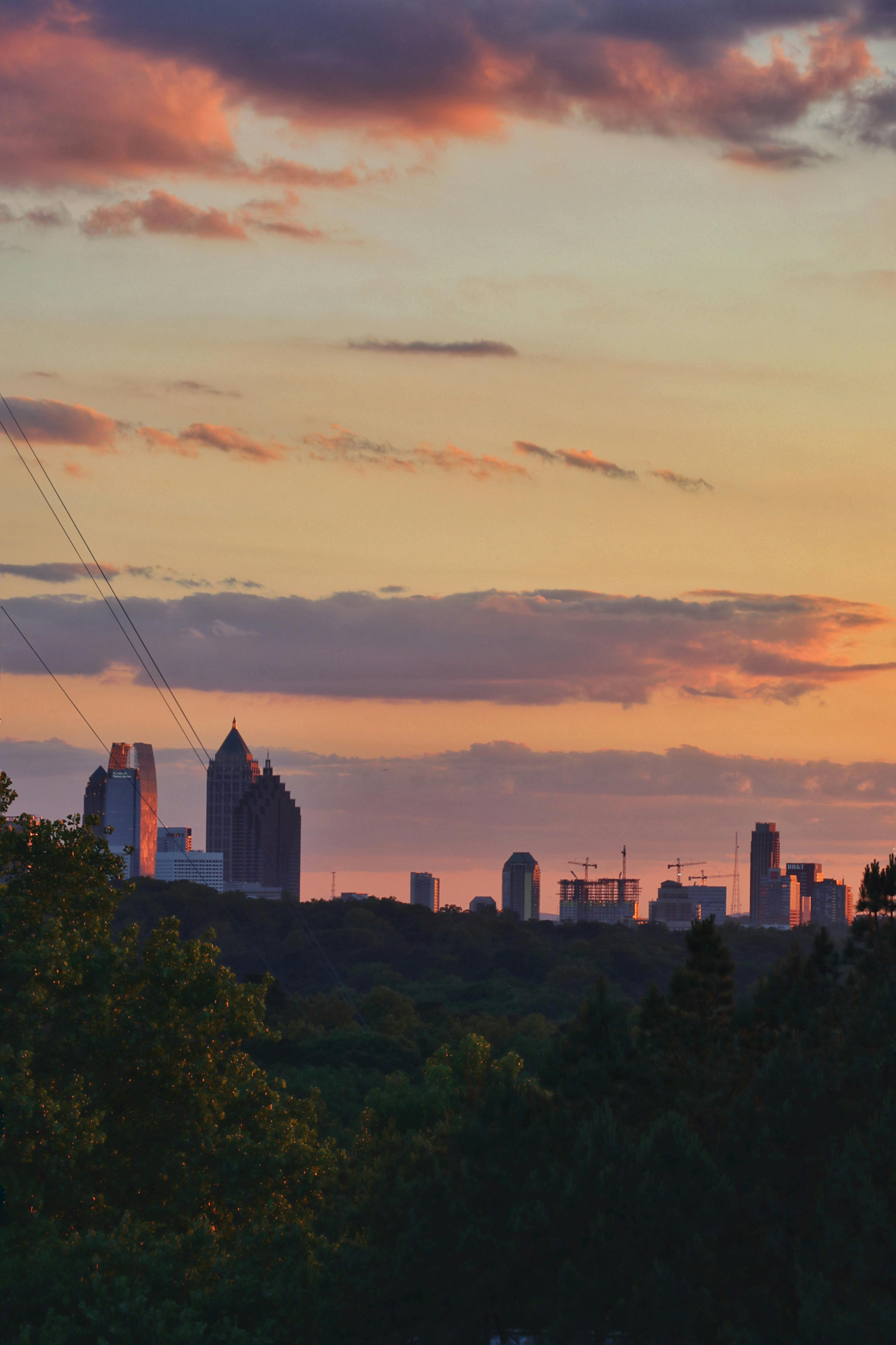Aerial Photography of High Rise Buildings during Sunset · Free Stock Photo