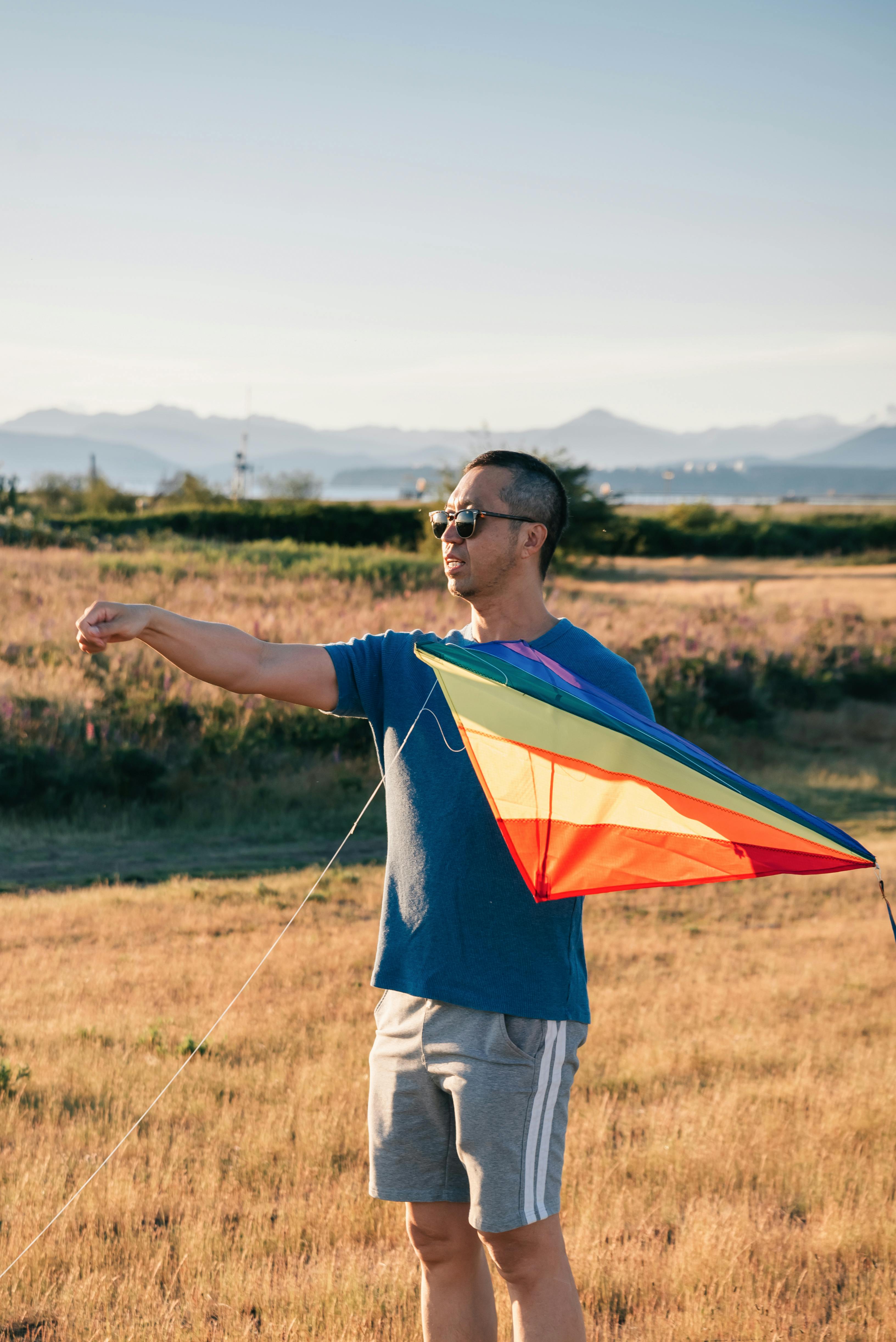 People Flying a Kite · Free Stock Photo