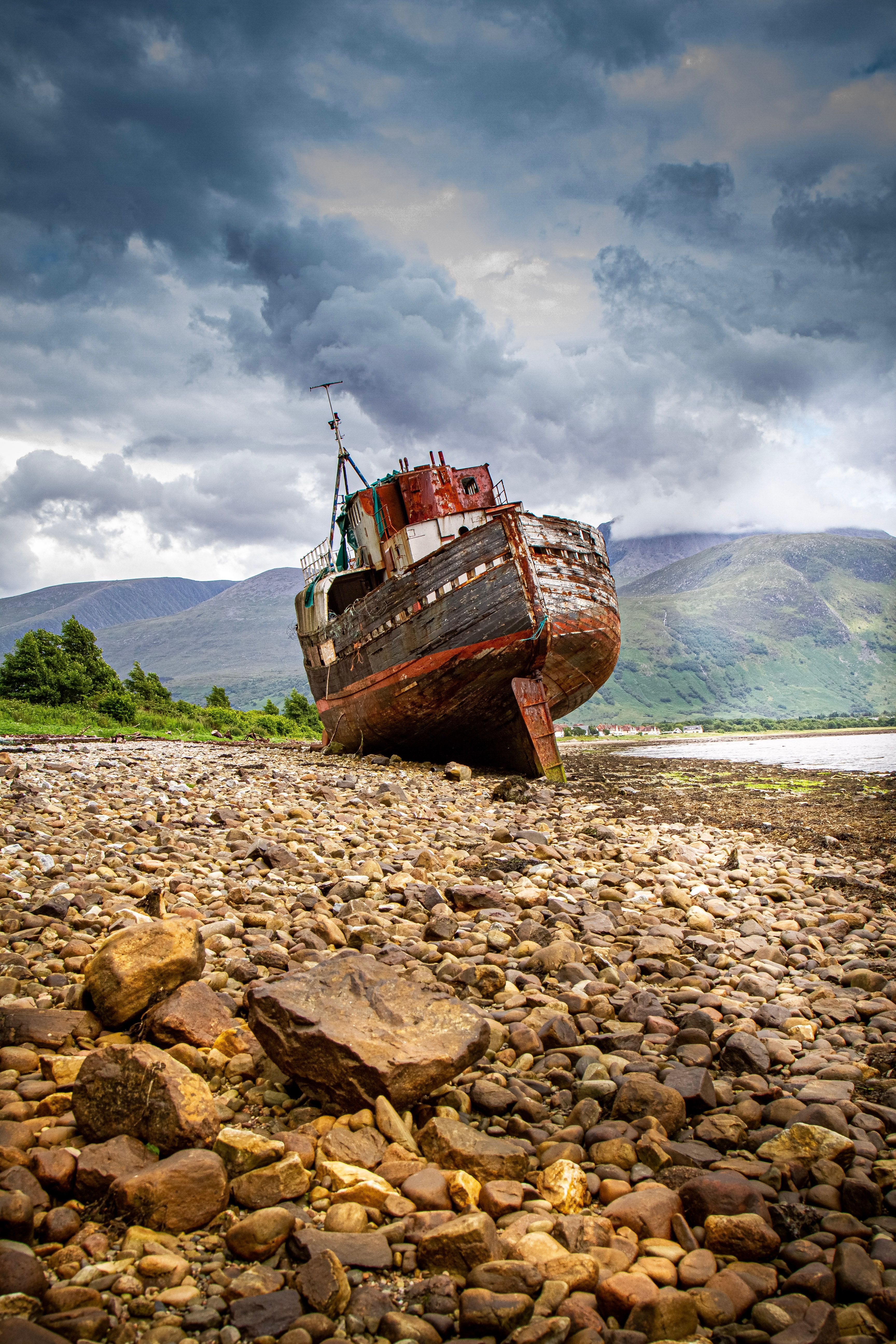 Shipwreck Lying on Beach · Free Stock Photo