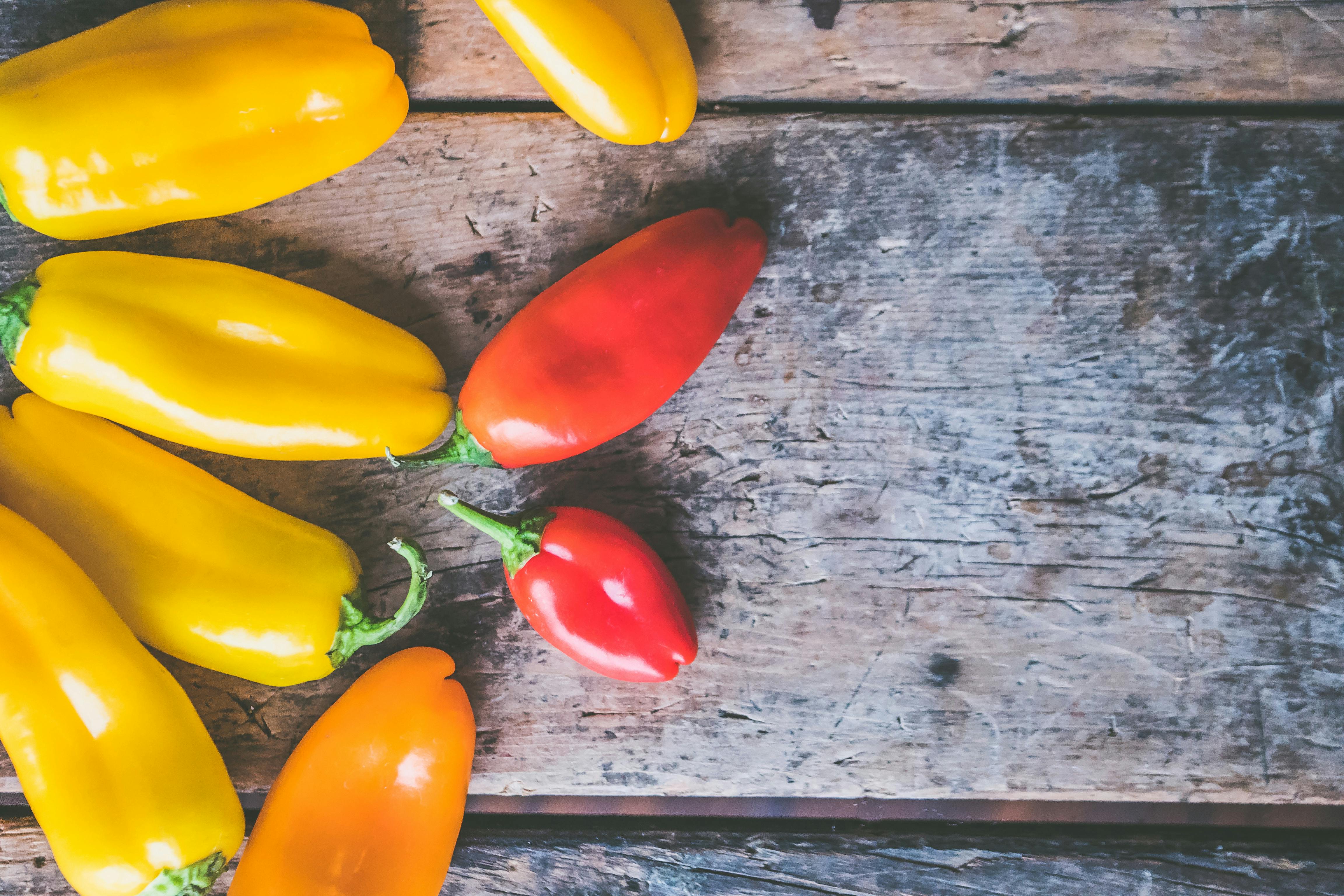 Bell Peppers on Gray Table · Free Stock Photo