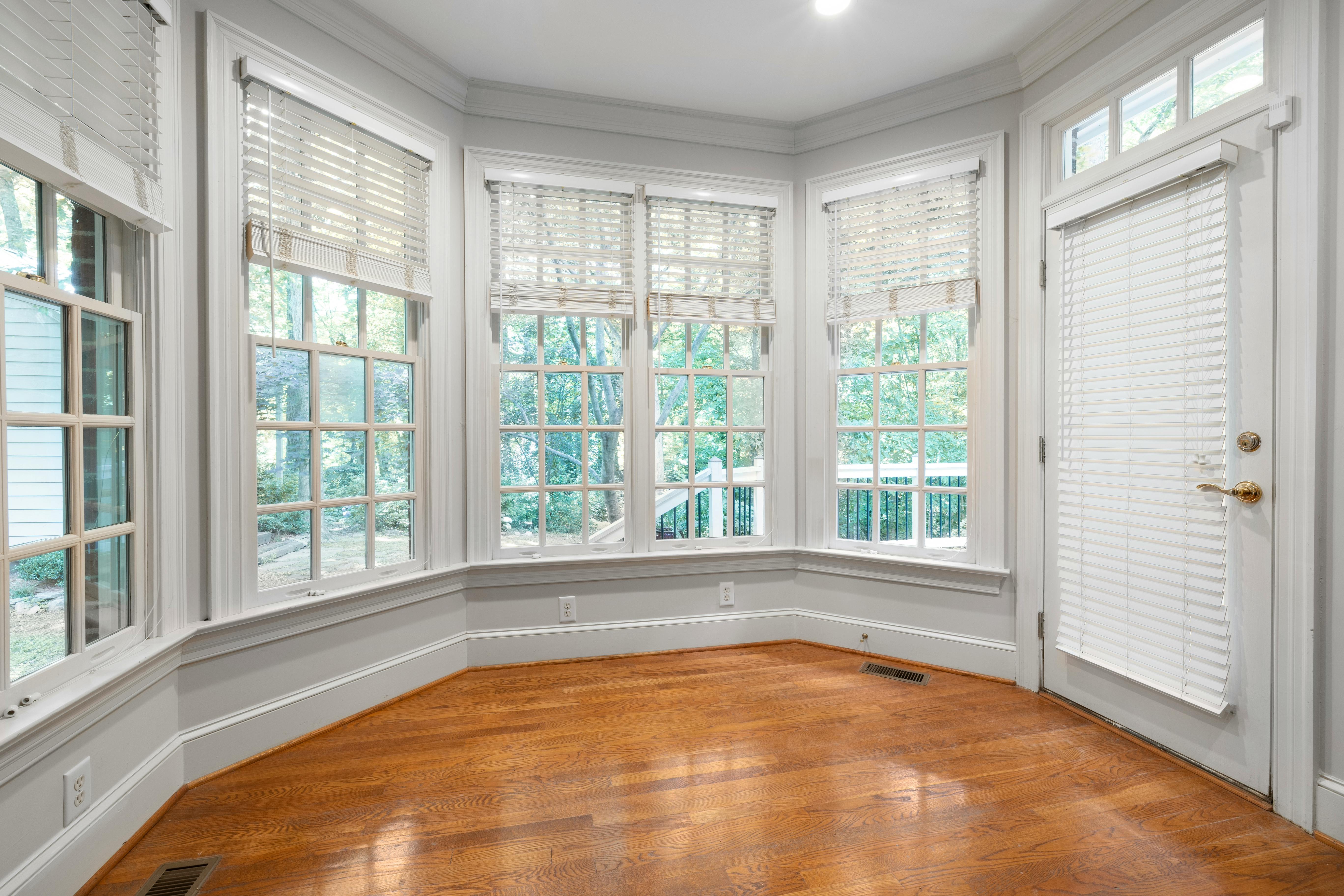 An Empty Room with Glass Windows · Free Stock Photo