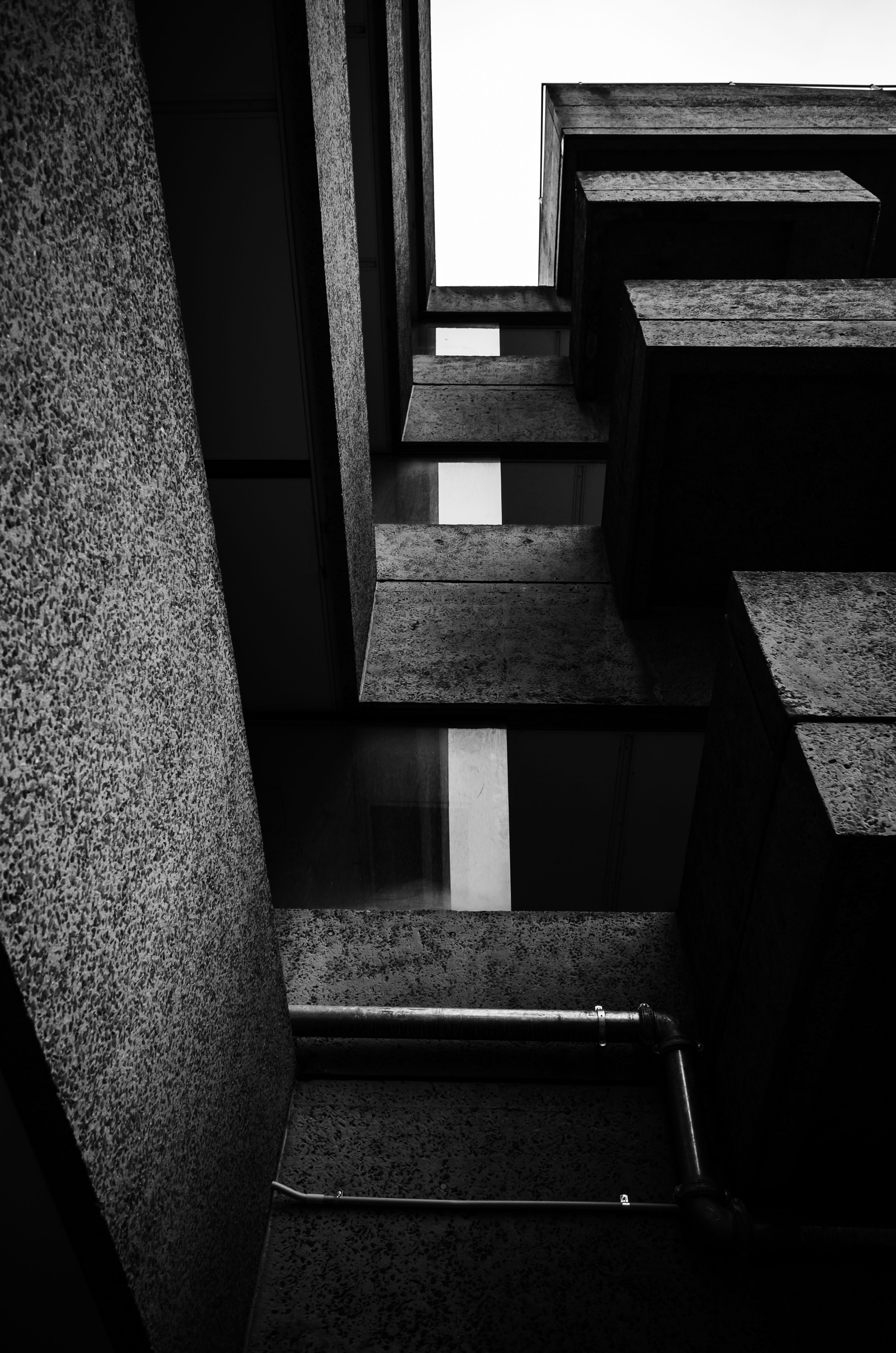 A Gray Multi Storey Concrete Building in Low Angle Shot · Free Stock Photo
