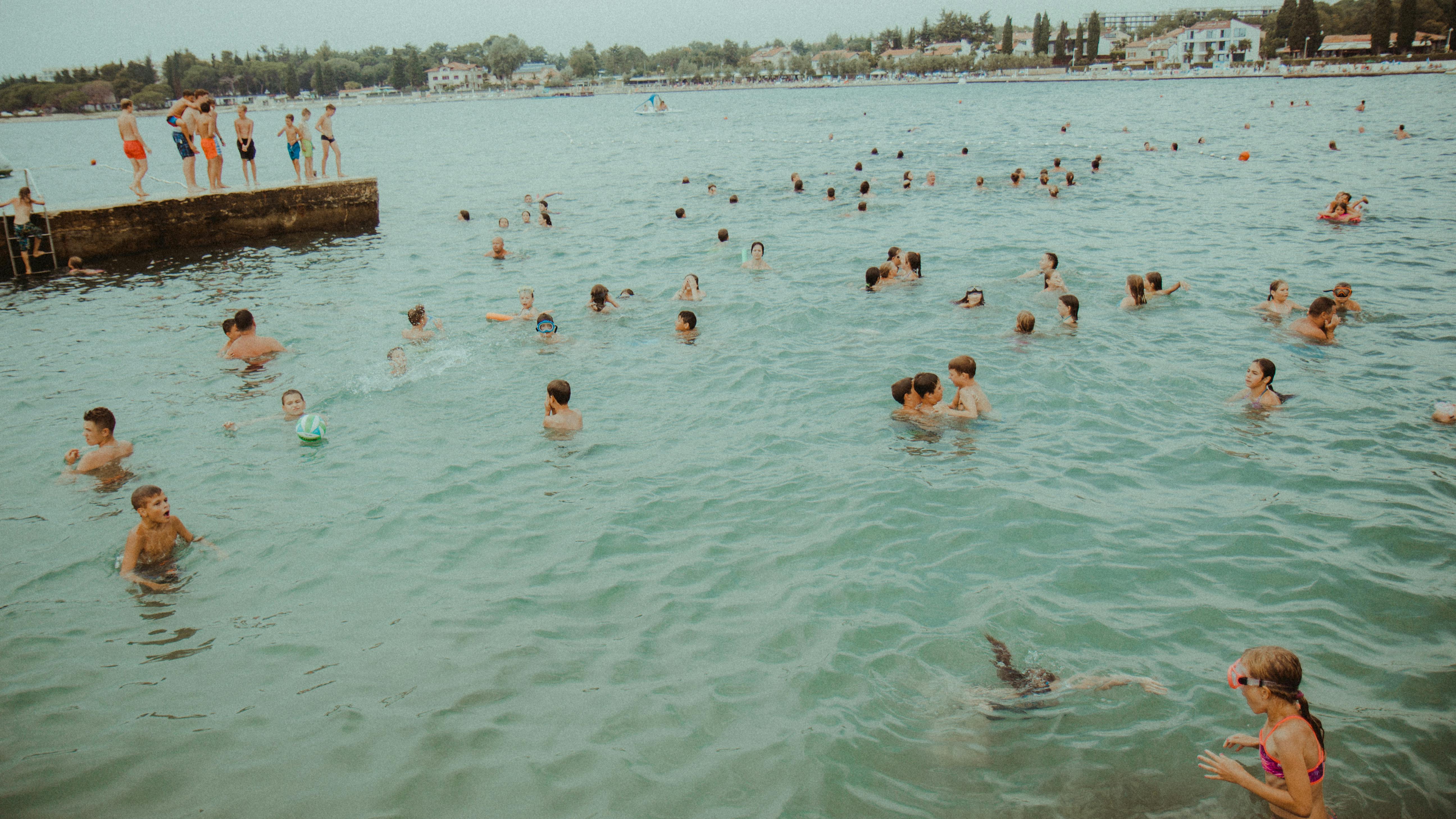 People in Water during Summertime · Free Stock Photo