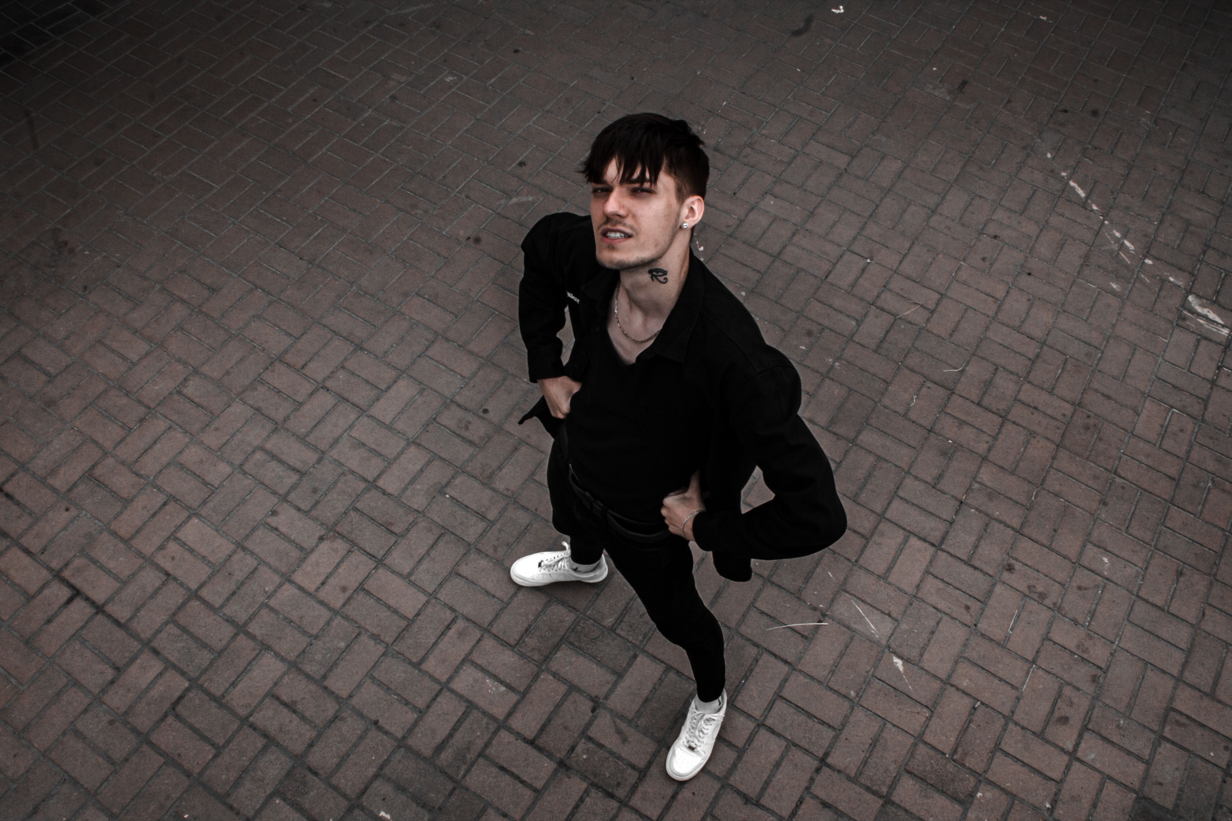 High Angle Shot of a Man in Black Long Sleeves · Free Stock Photo