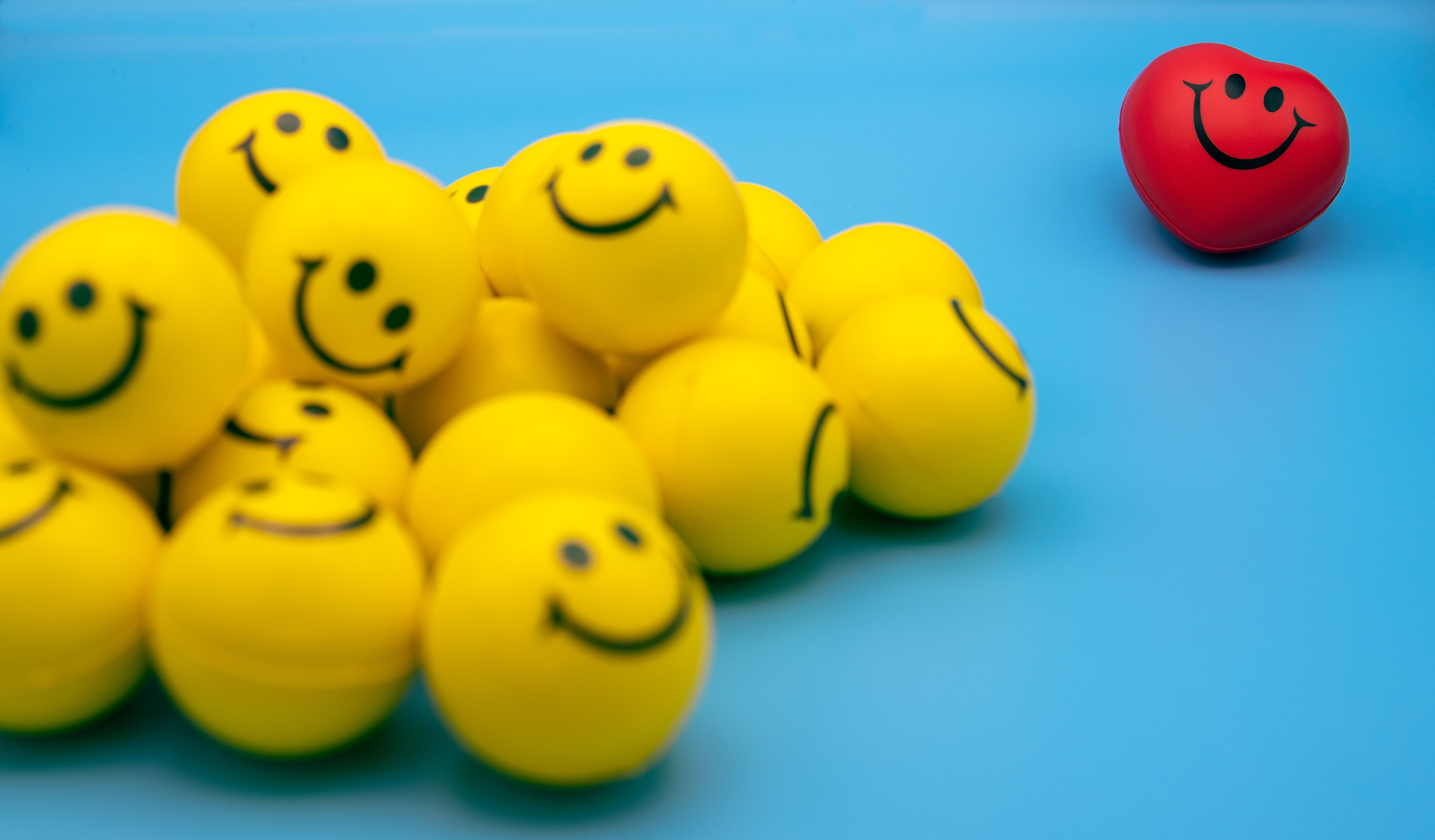Yellow Smiley Emoji on Gray Surface · Free Stock Photo