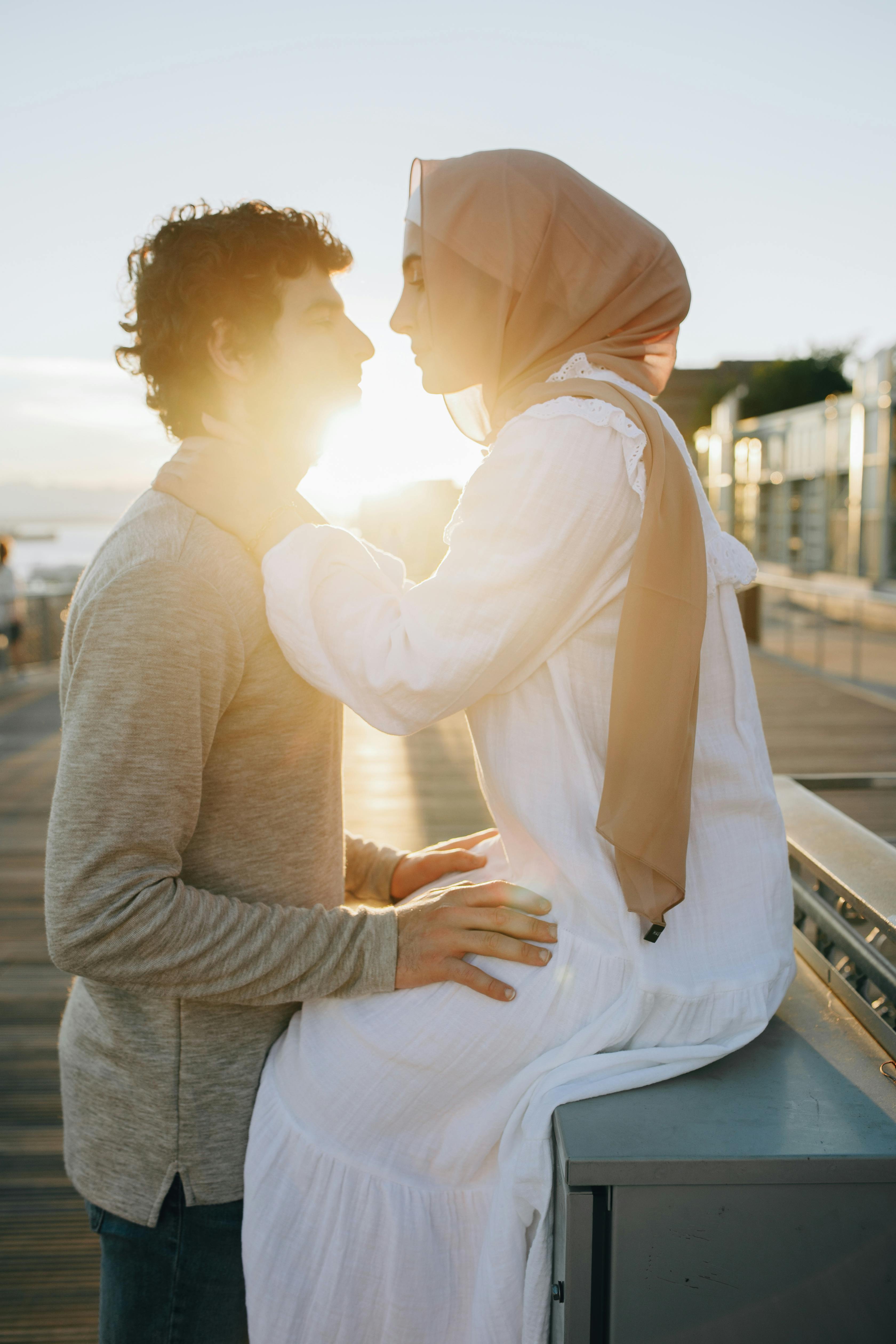 Couple sitting beside Counter Top · Free Stock Photo