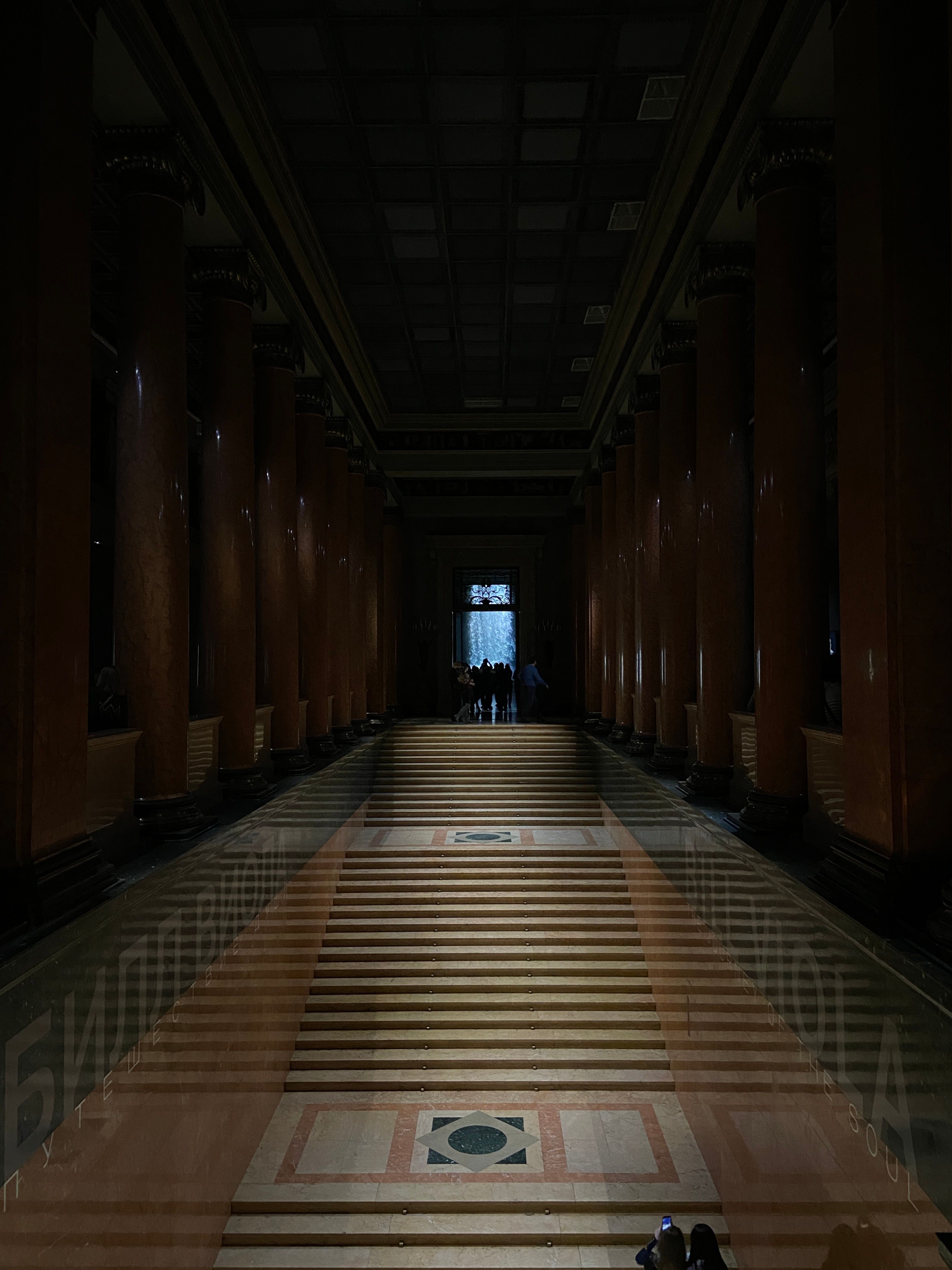 An Empty Dark Hallway Illuminated with Lights · Free Stock Photo