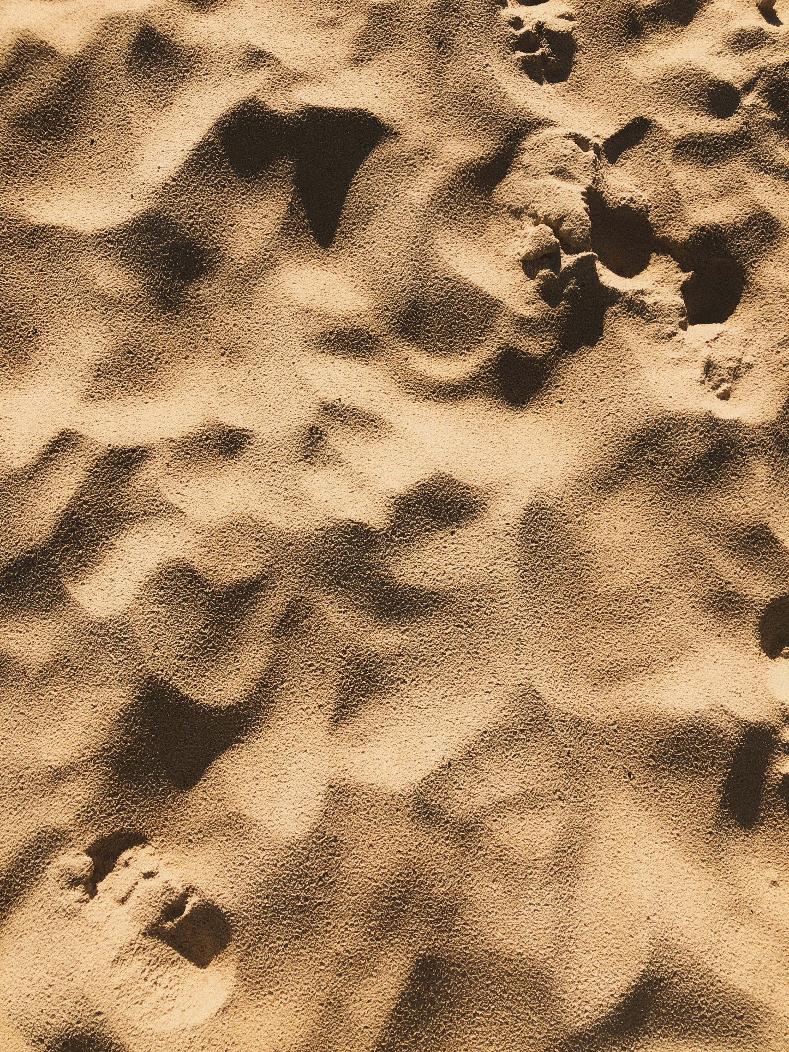 Dry Sand Scattered by Neatly Wave · Free Stock Photo