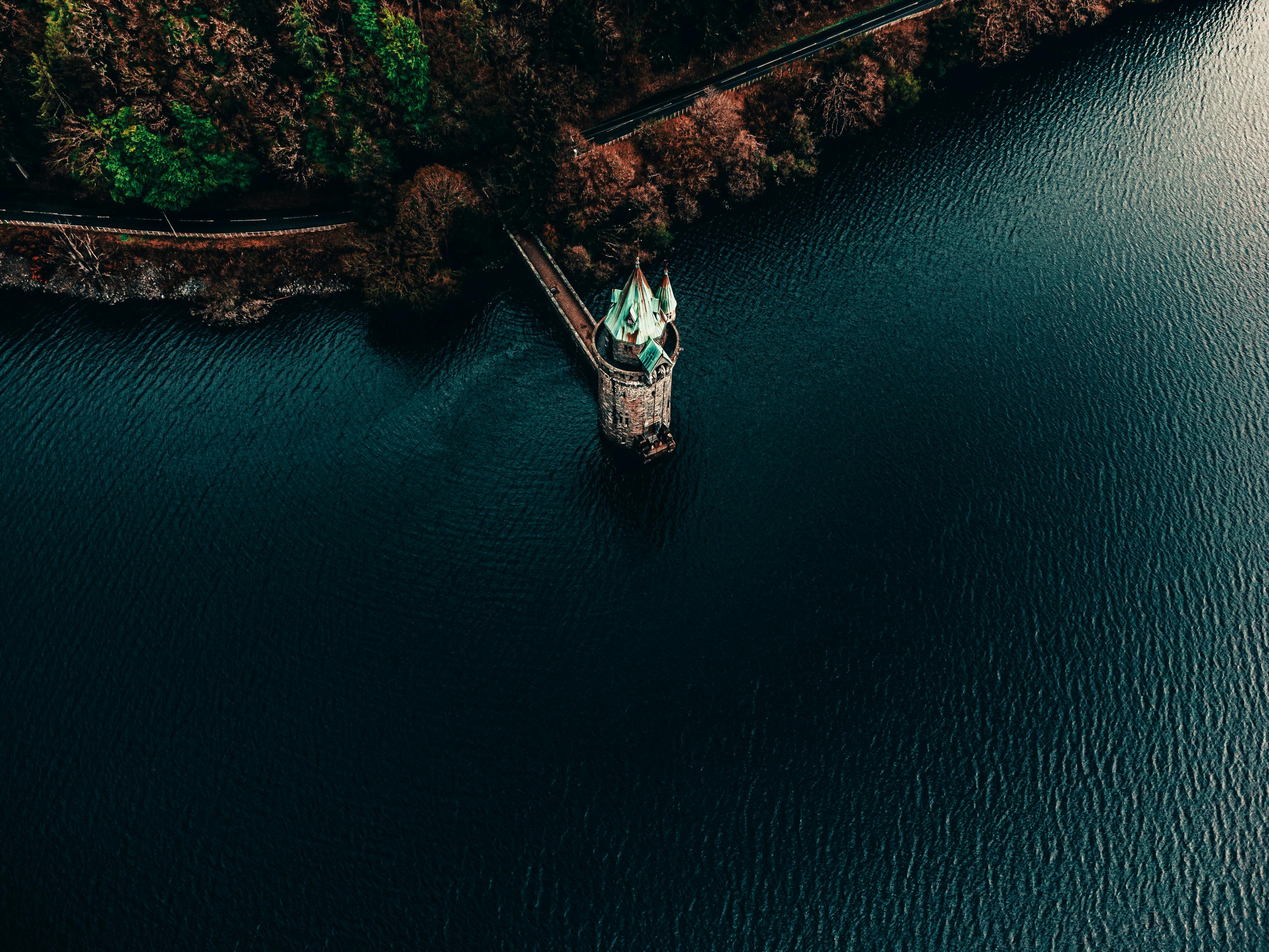 Aerial View of Watchtower by Sea Shore · Free Stock Photo