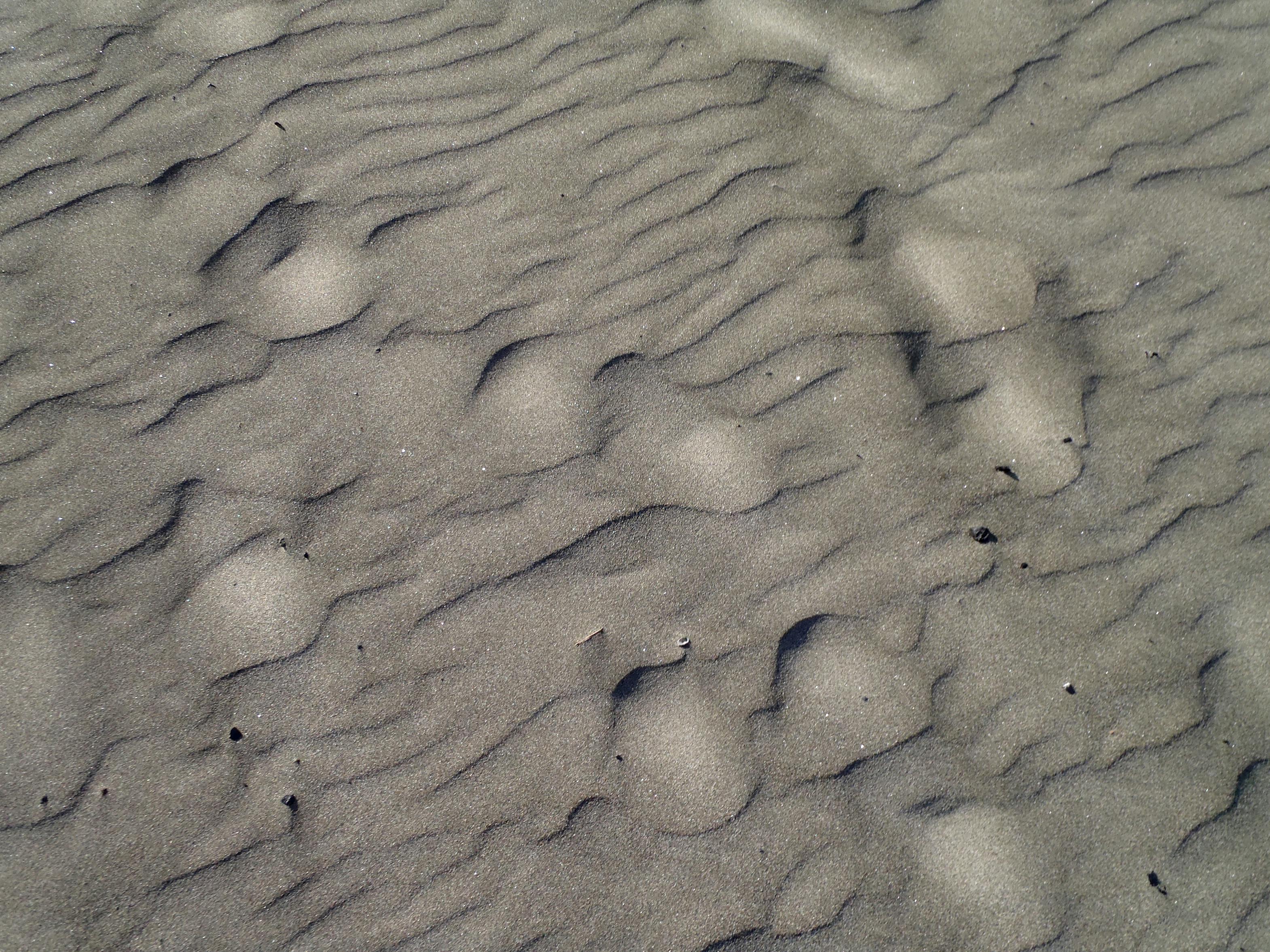 Sand's Surface with Ripples and Foot Mark's · Free Stock Photo