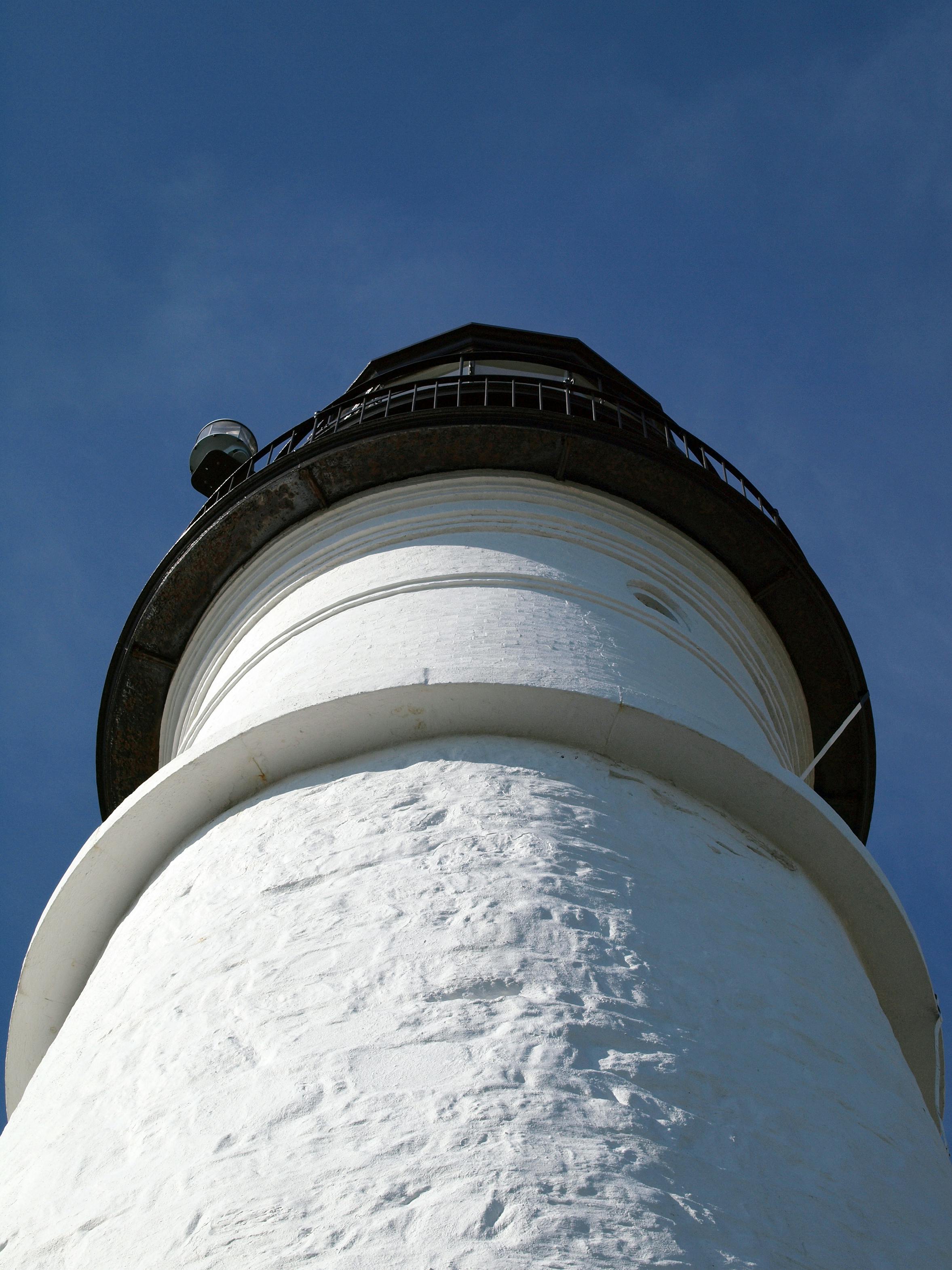 A White Concrete Lighthouse · Free Stock Photo